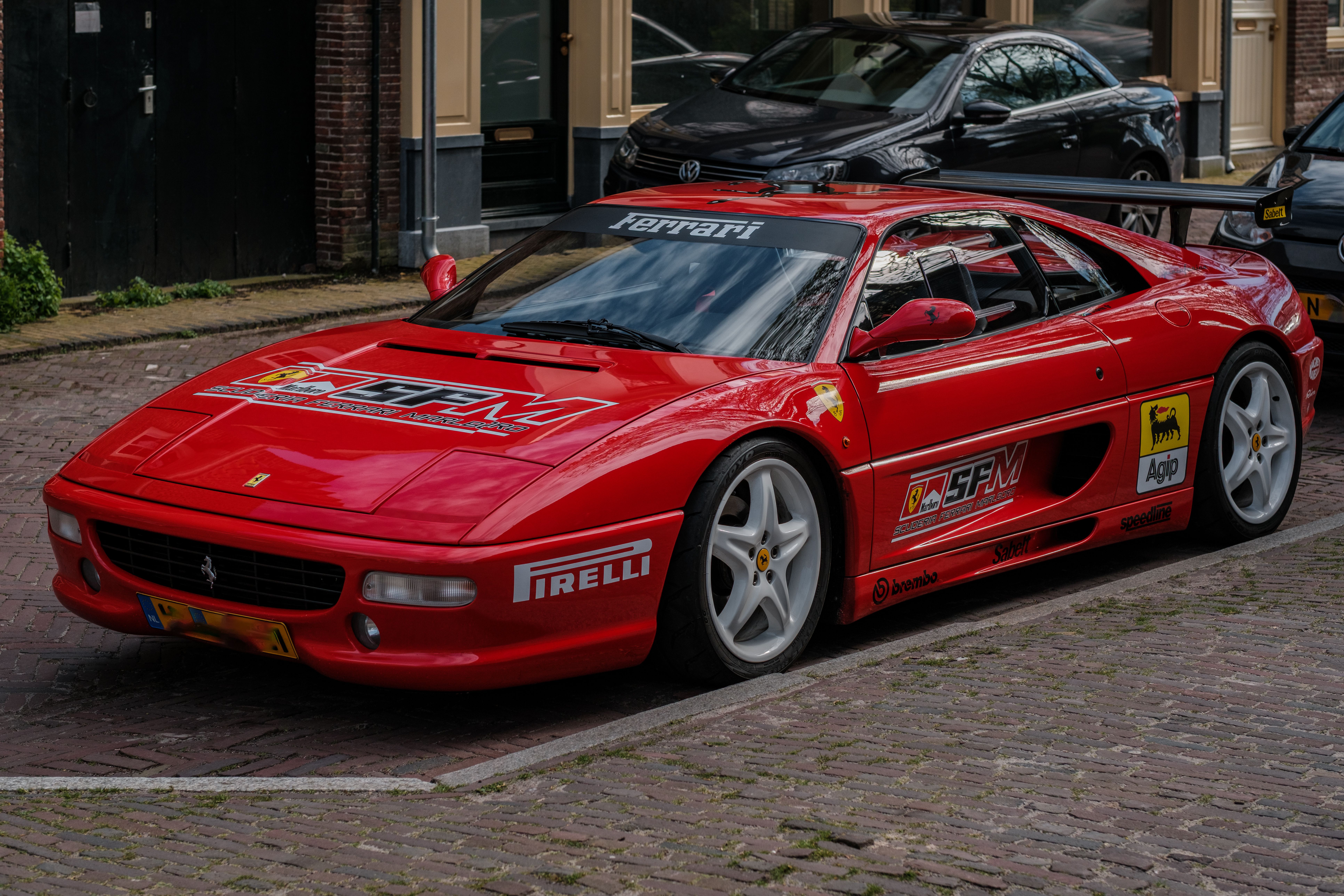 Classic Ferrari Sports Car in Urban Street · Free Stock Photo