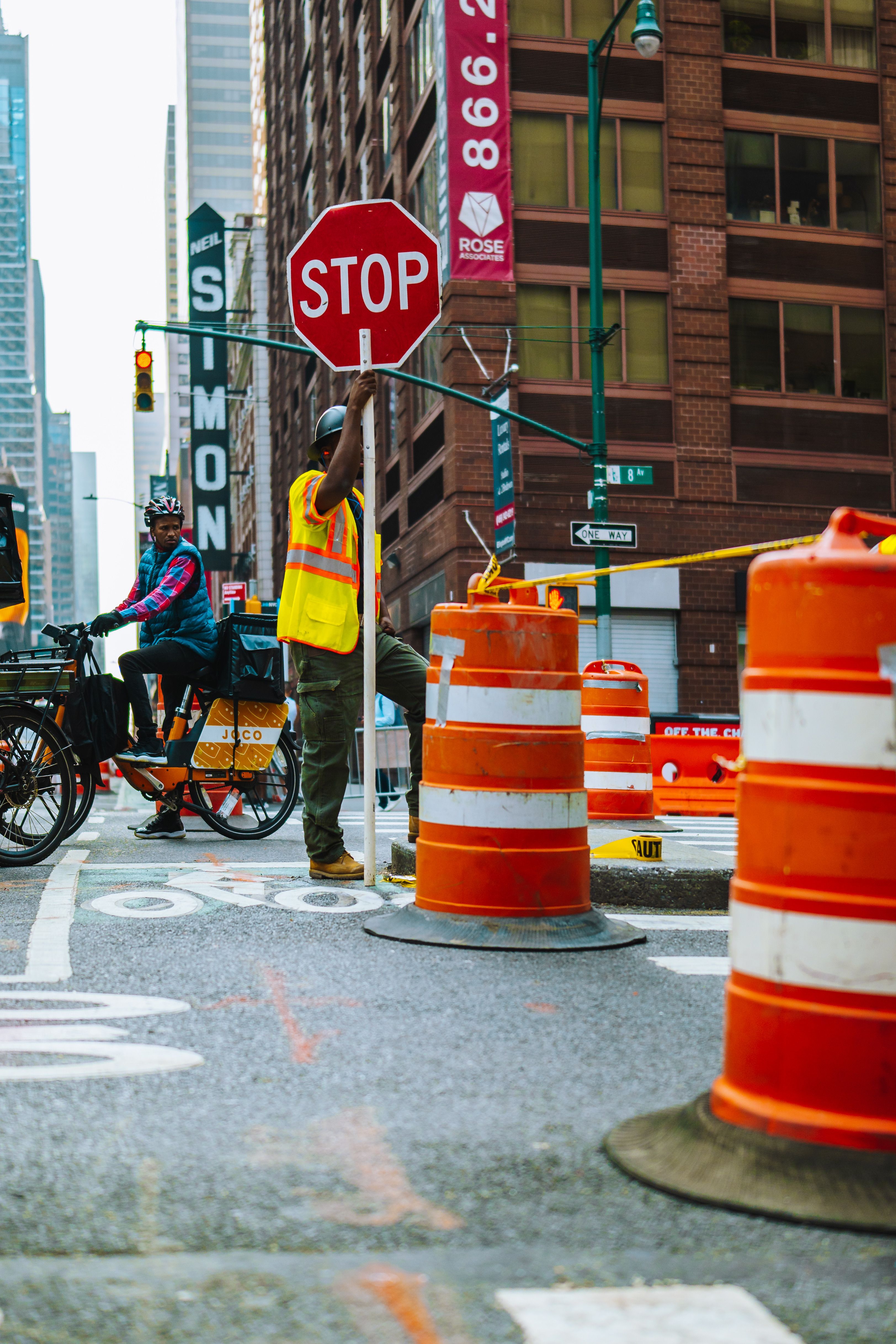 Two Men Walking on the Pedestrian Lane · Free Stock Photo