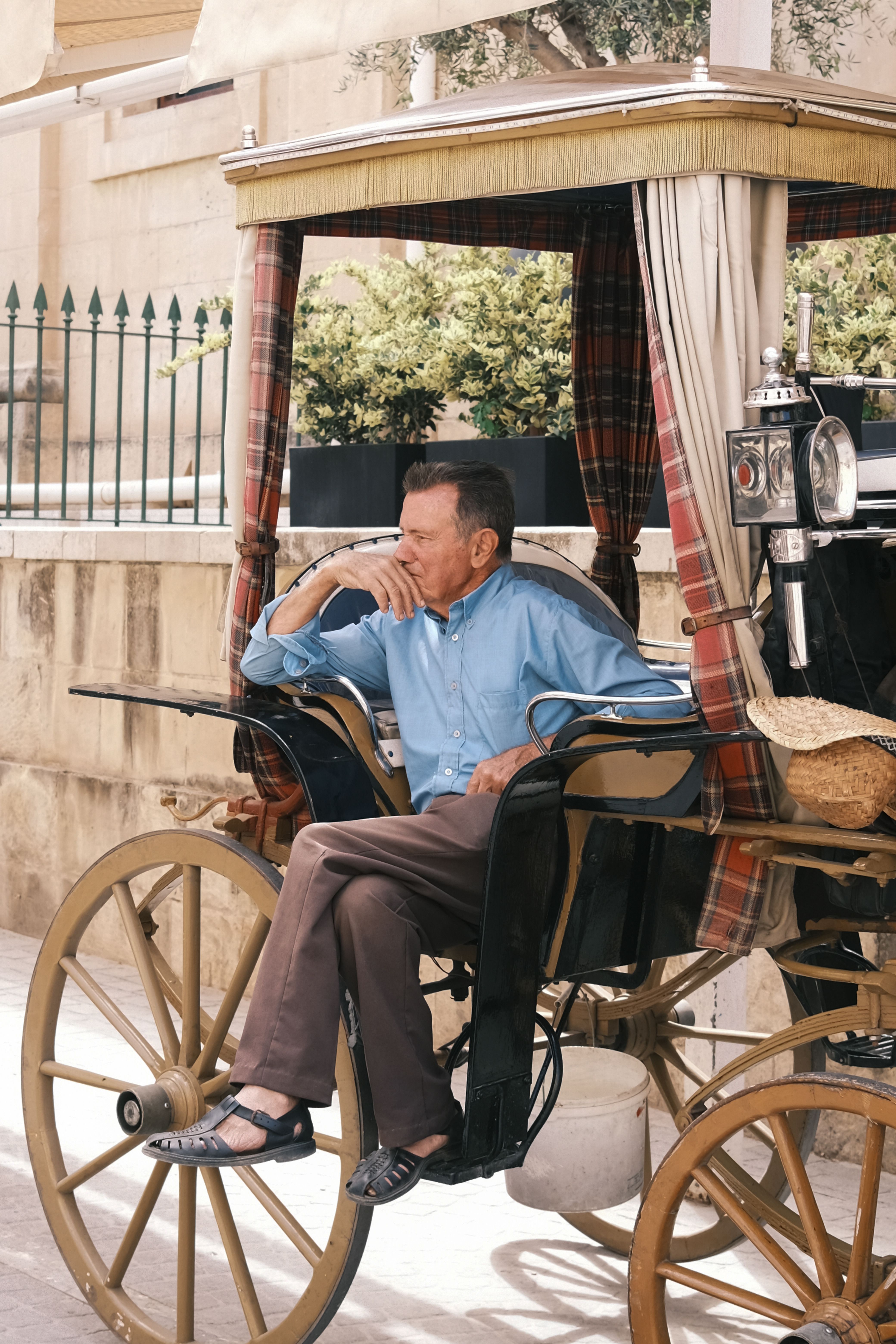 Man Relaxing in Traditional Maltese Horse Carriage · Free Stock Photo
