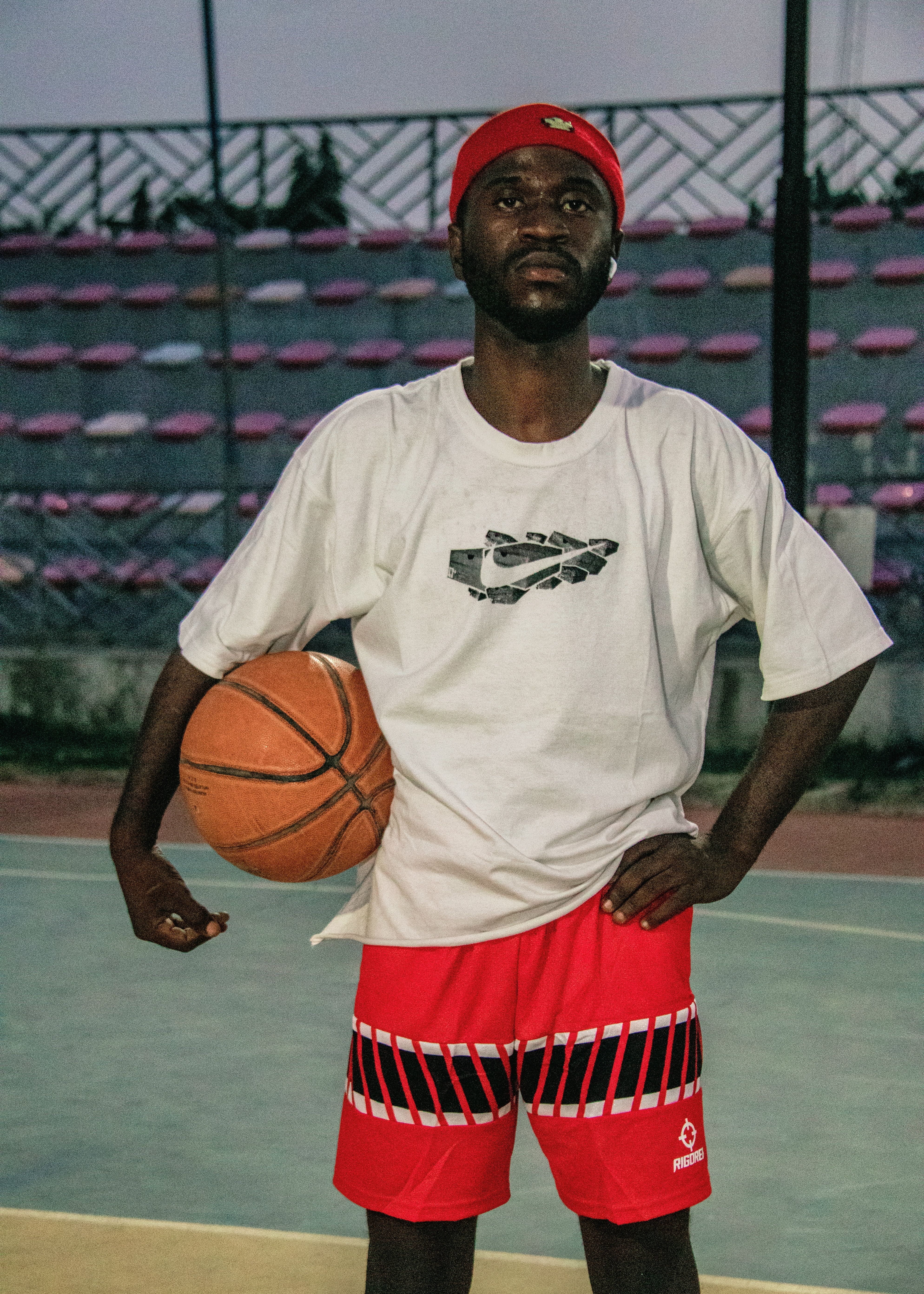 Basketball Player Posing on Outdoor Court · Free Stock Photo