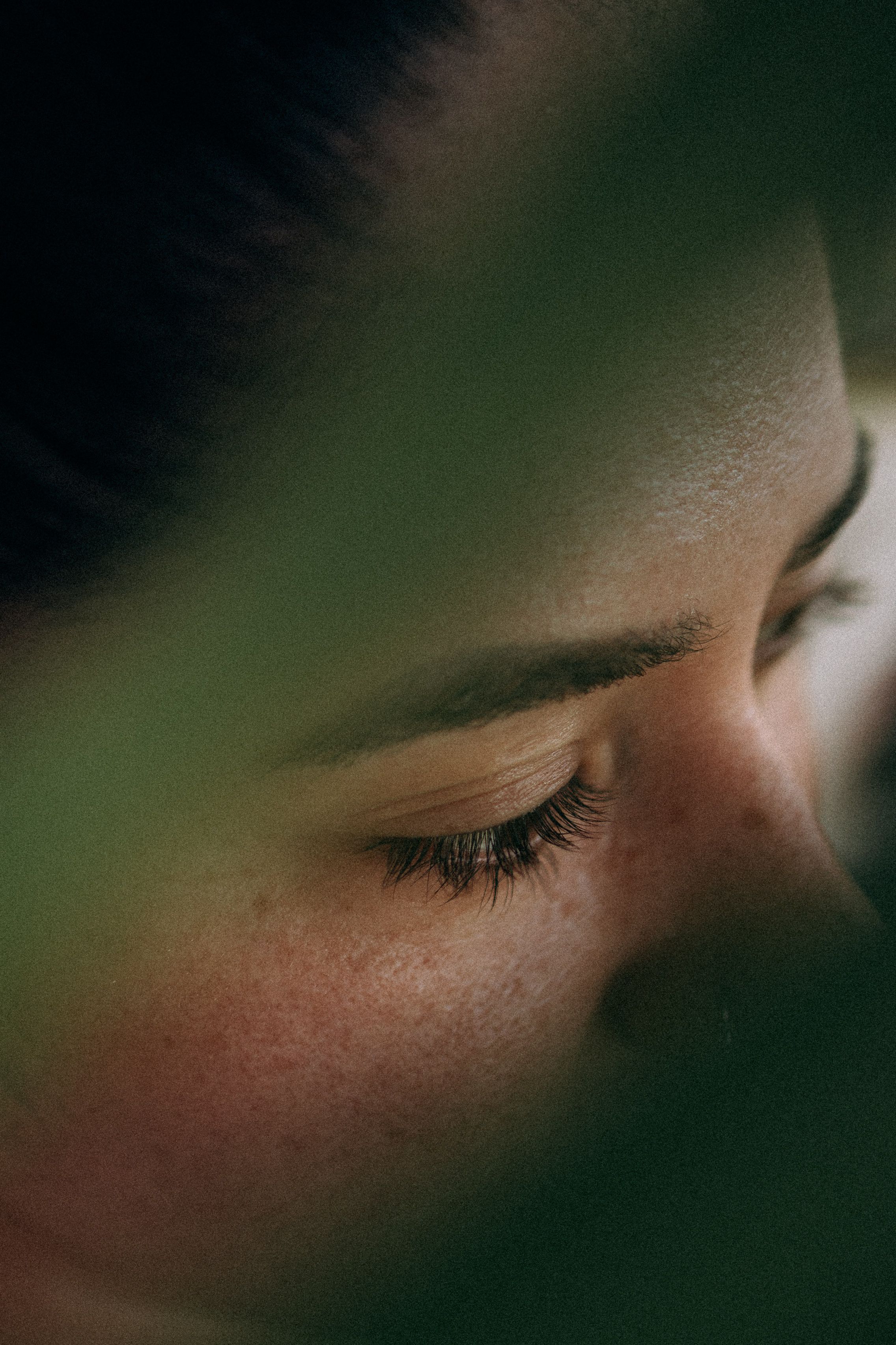Close-Up Portrait with Natural Lighting and Shadows · Free Stock Photo