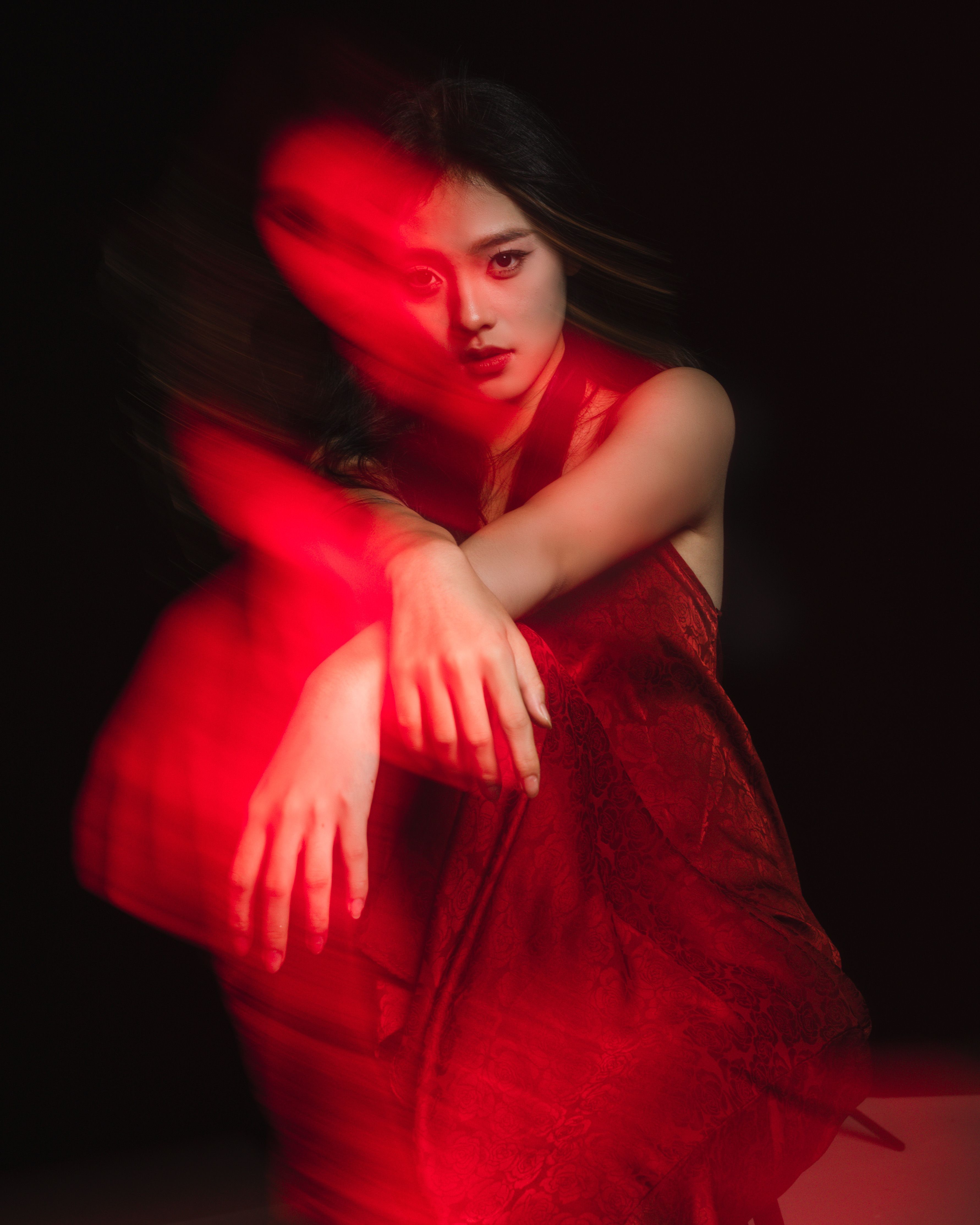 Artistic Portrait with Dynamic Red Motion Blur · Free Stock Photo