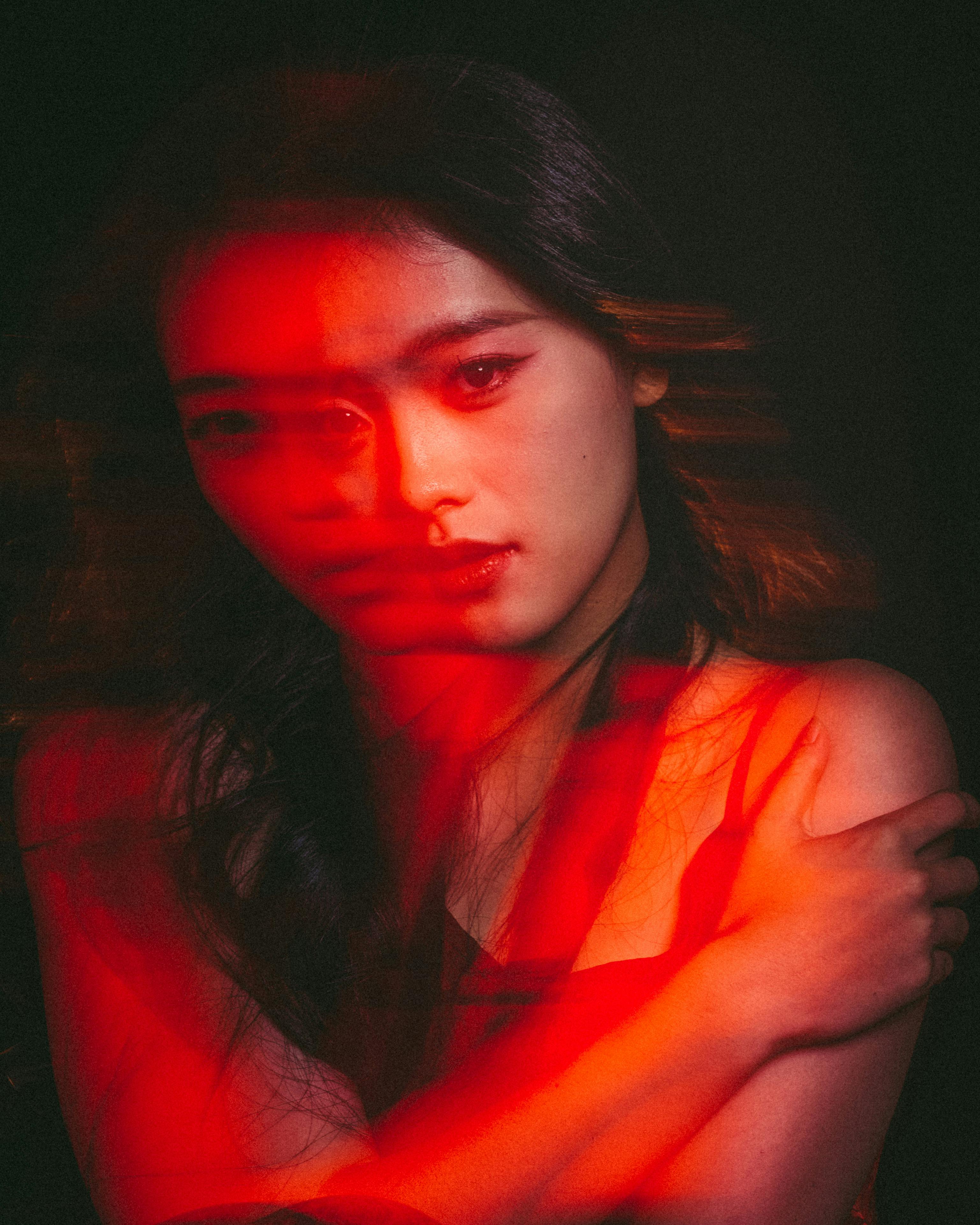 Artistic Portrait with Red Light Effects · Free Stock Photo