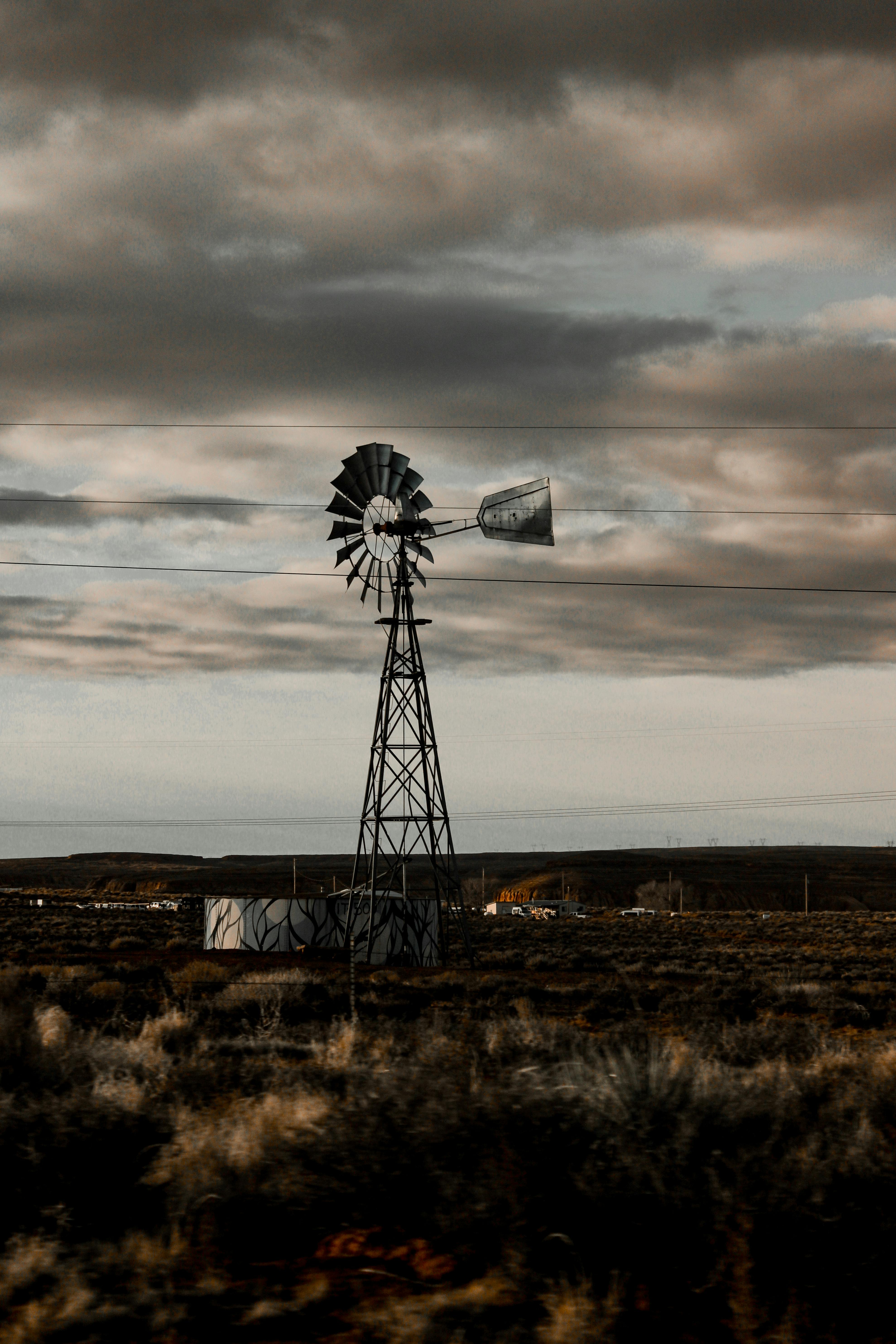 Gray Windmill on Brown Field · Free Stock Photo