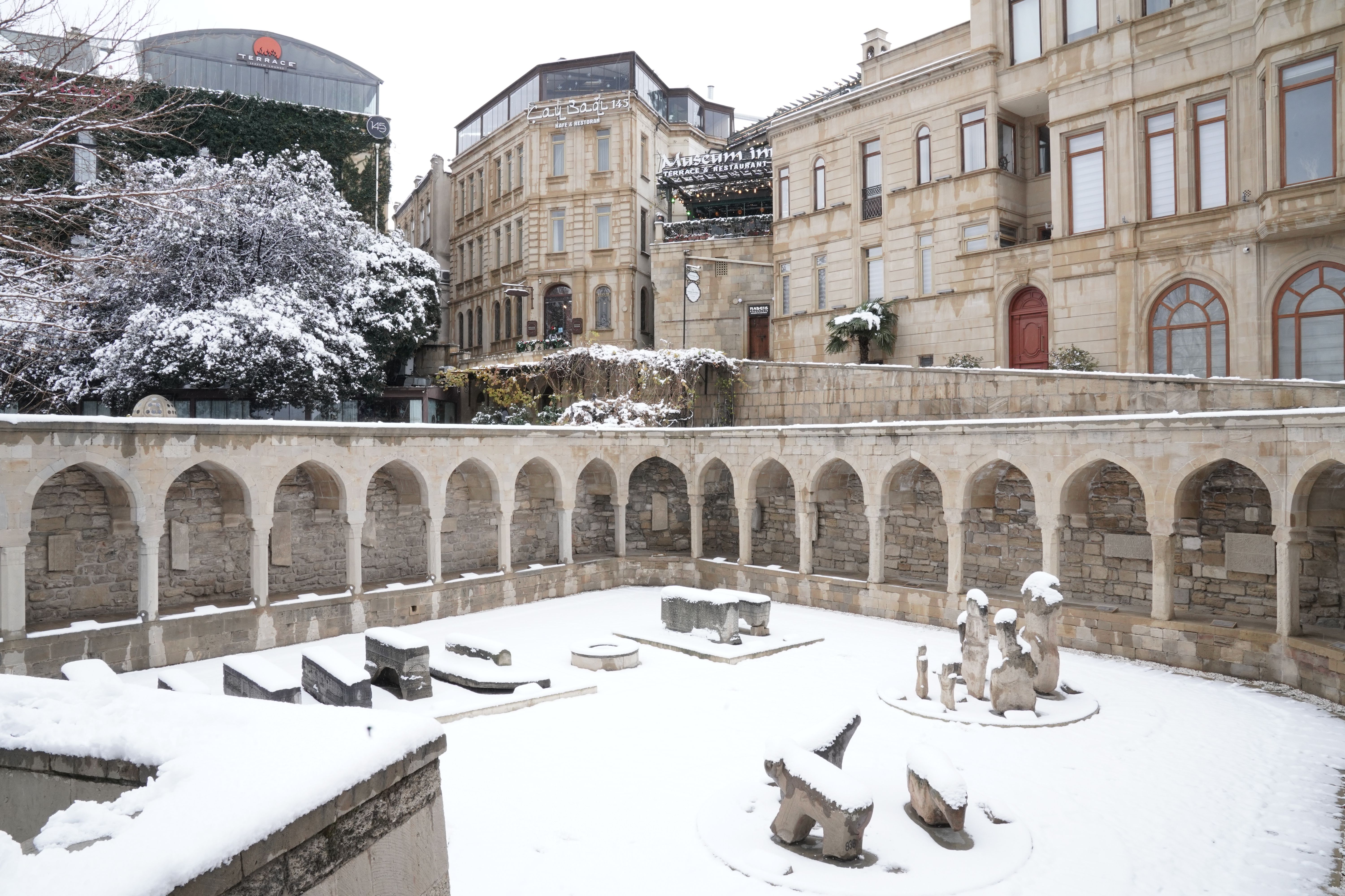 Snowy Courtyard in Historic Old Town · Free Stock Photo