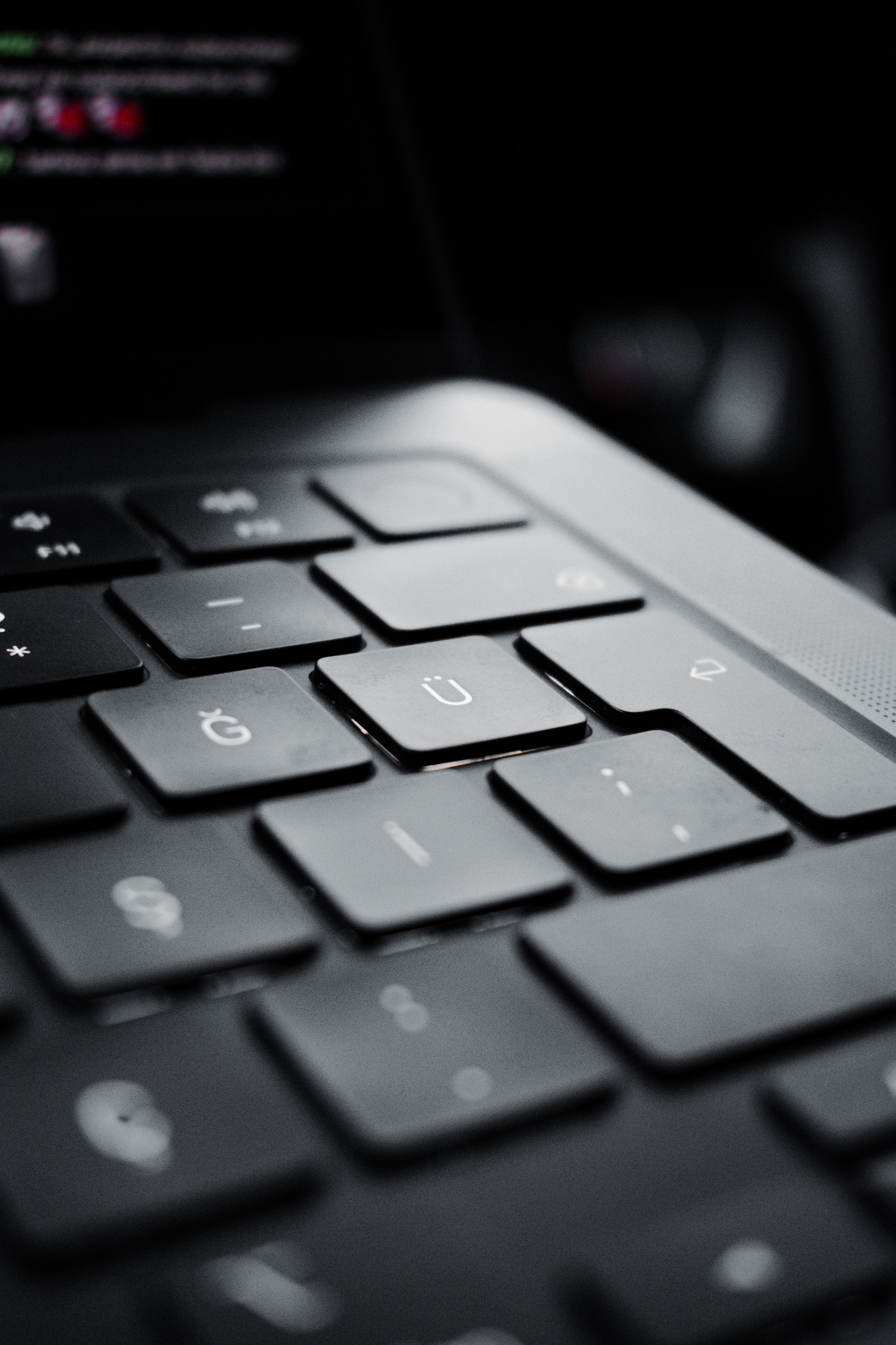 Under Construction Signage on Laptop Keyboard · Free Stock Photo