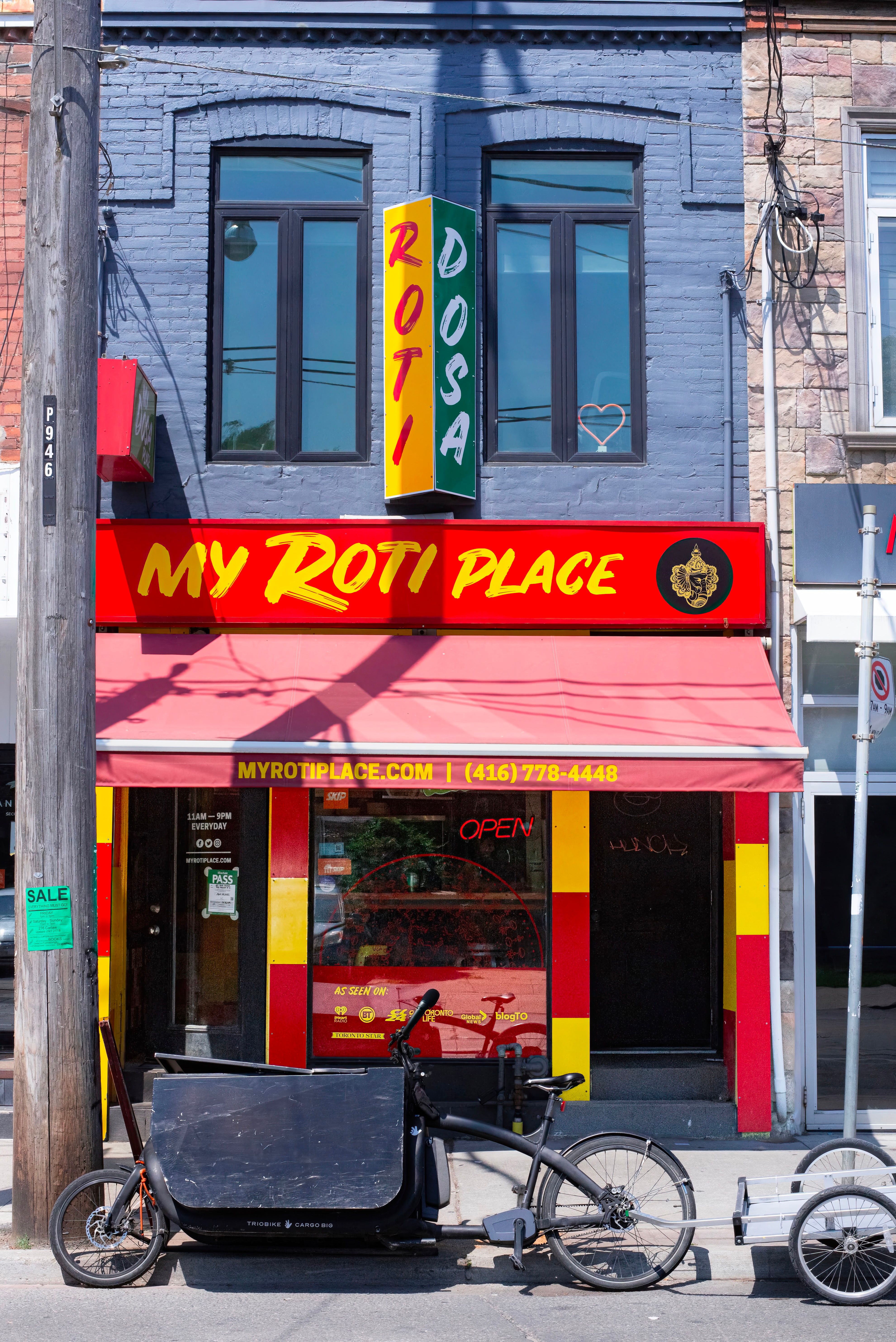 Colorful Urban Storefront of My Roti Place · Free Stock Photo