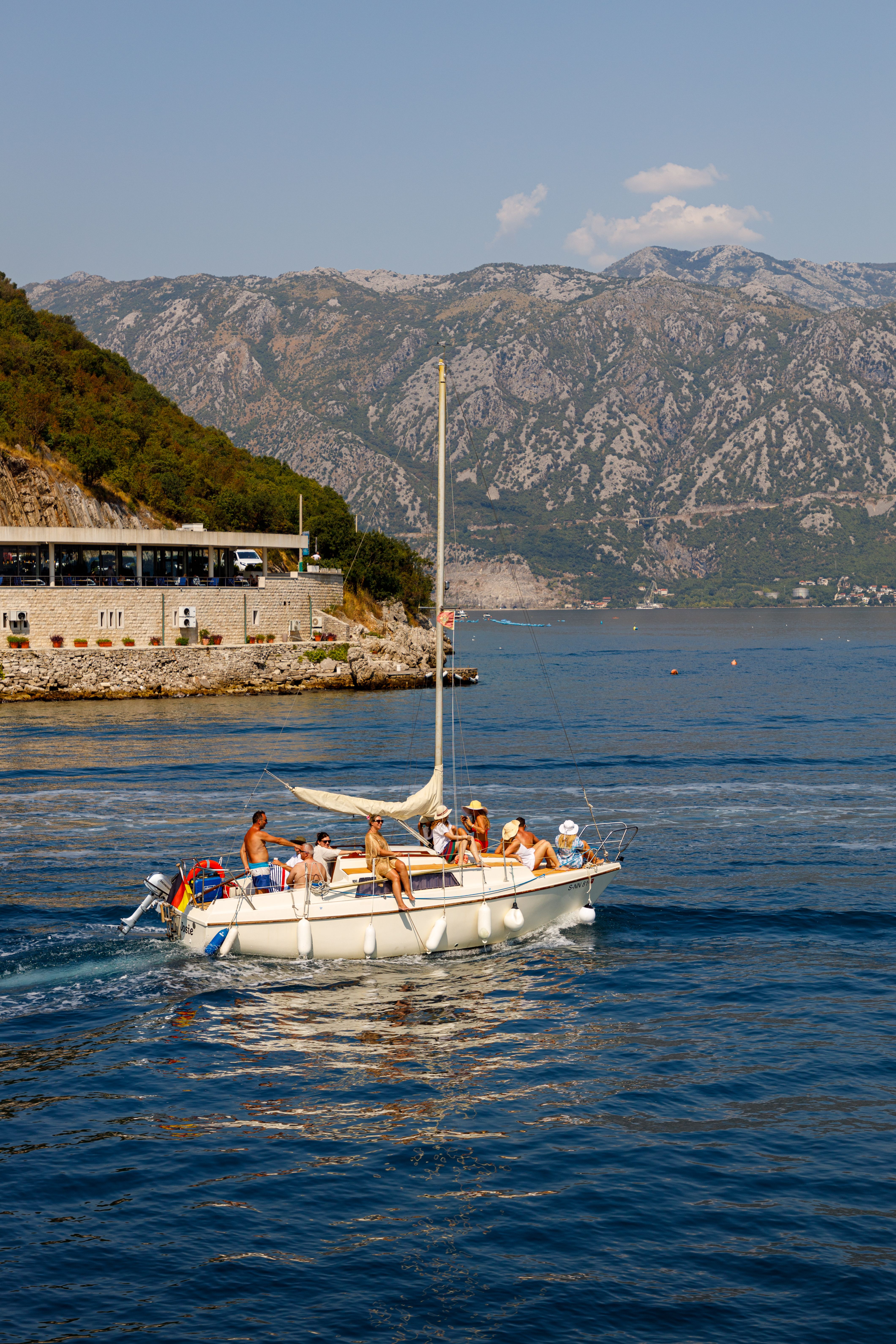 Boat Sailing in Scenic Kotor Bay Montenegro · Free Stock Photo