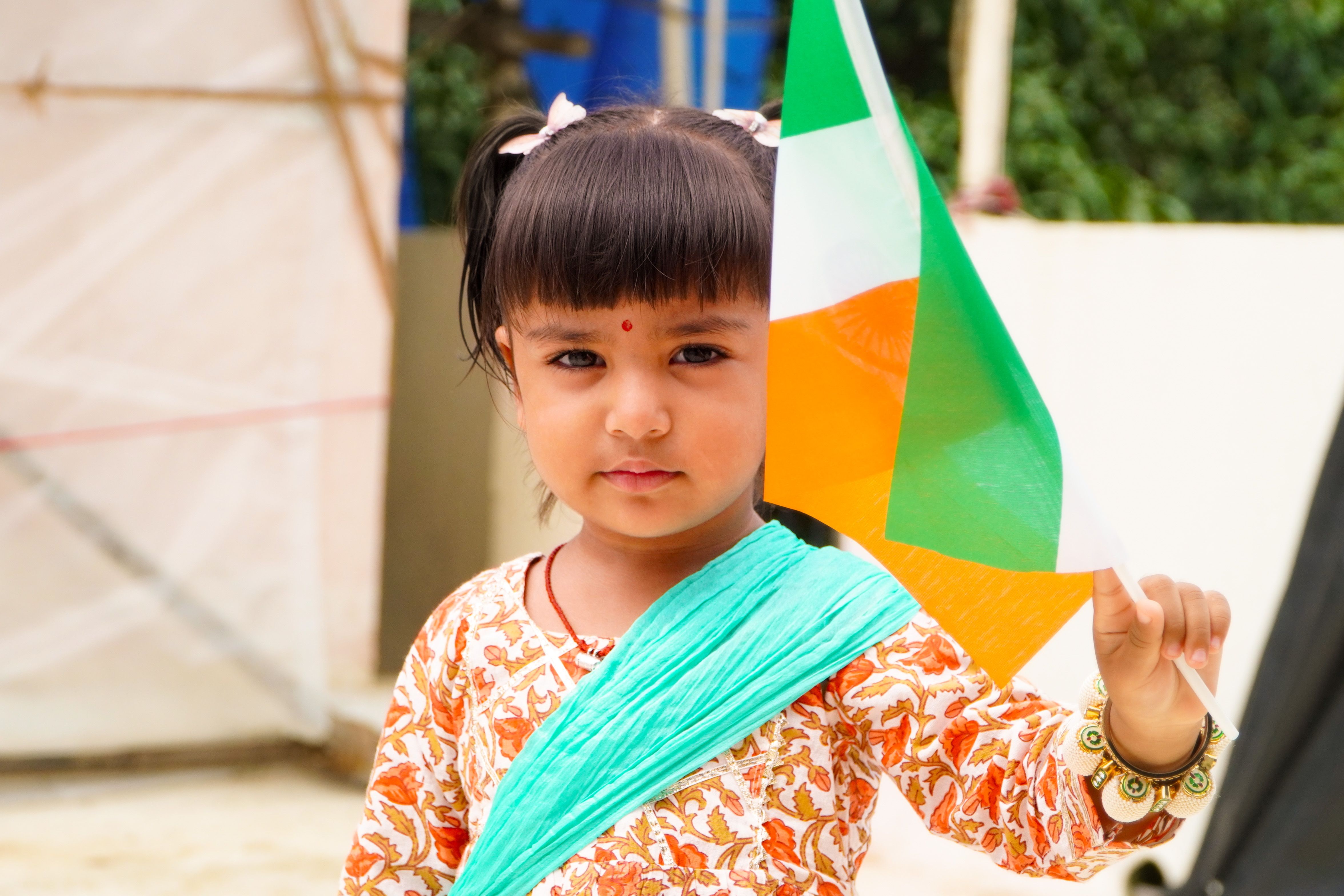 Cute Child Celebrating with Indian Flag Outdoors · Free Stock Photo