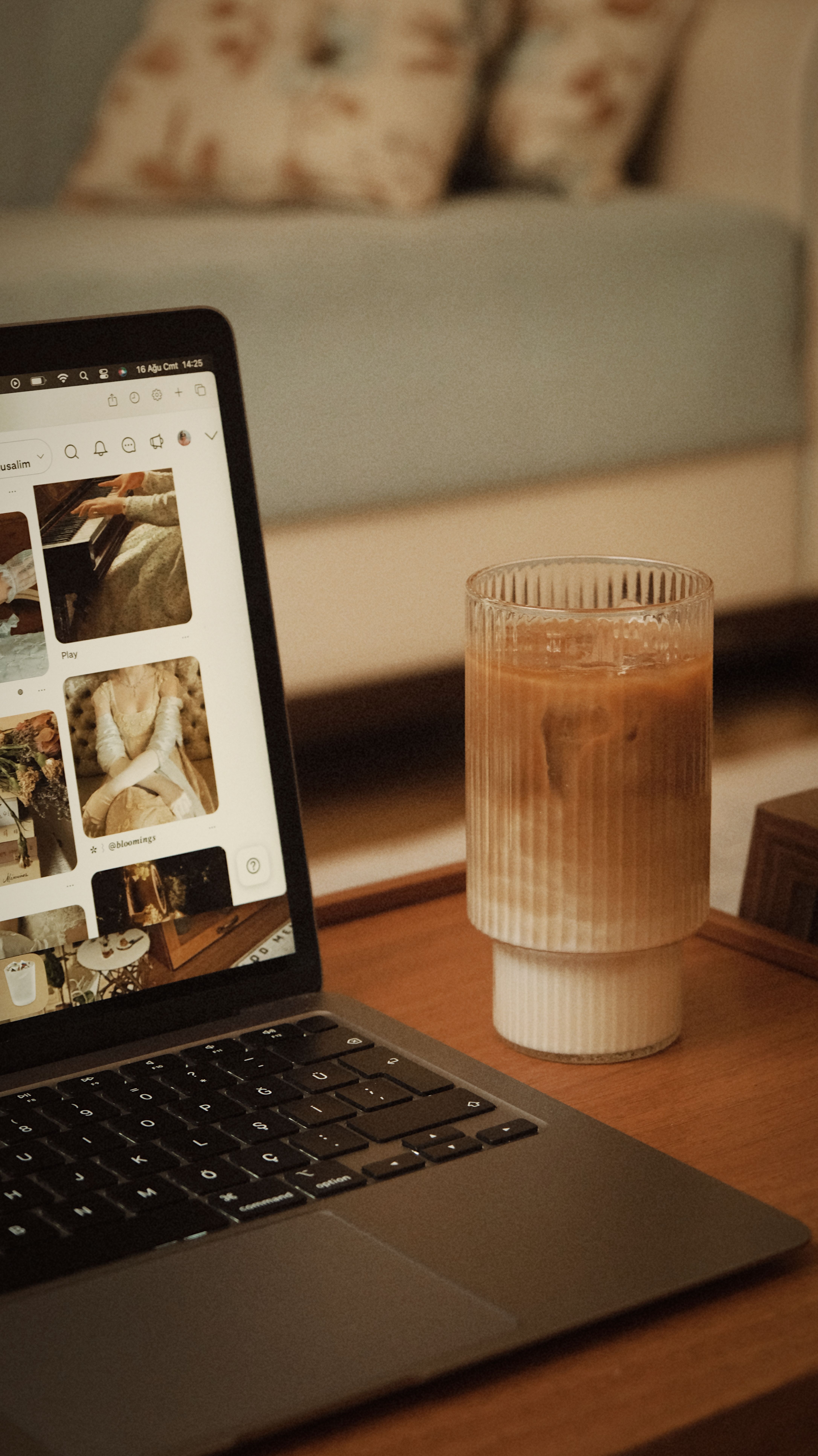 Cozy Indoor Setting with Iced Coffee and Laptop · Free Stock Photo