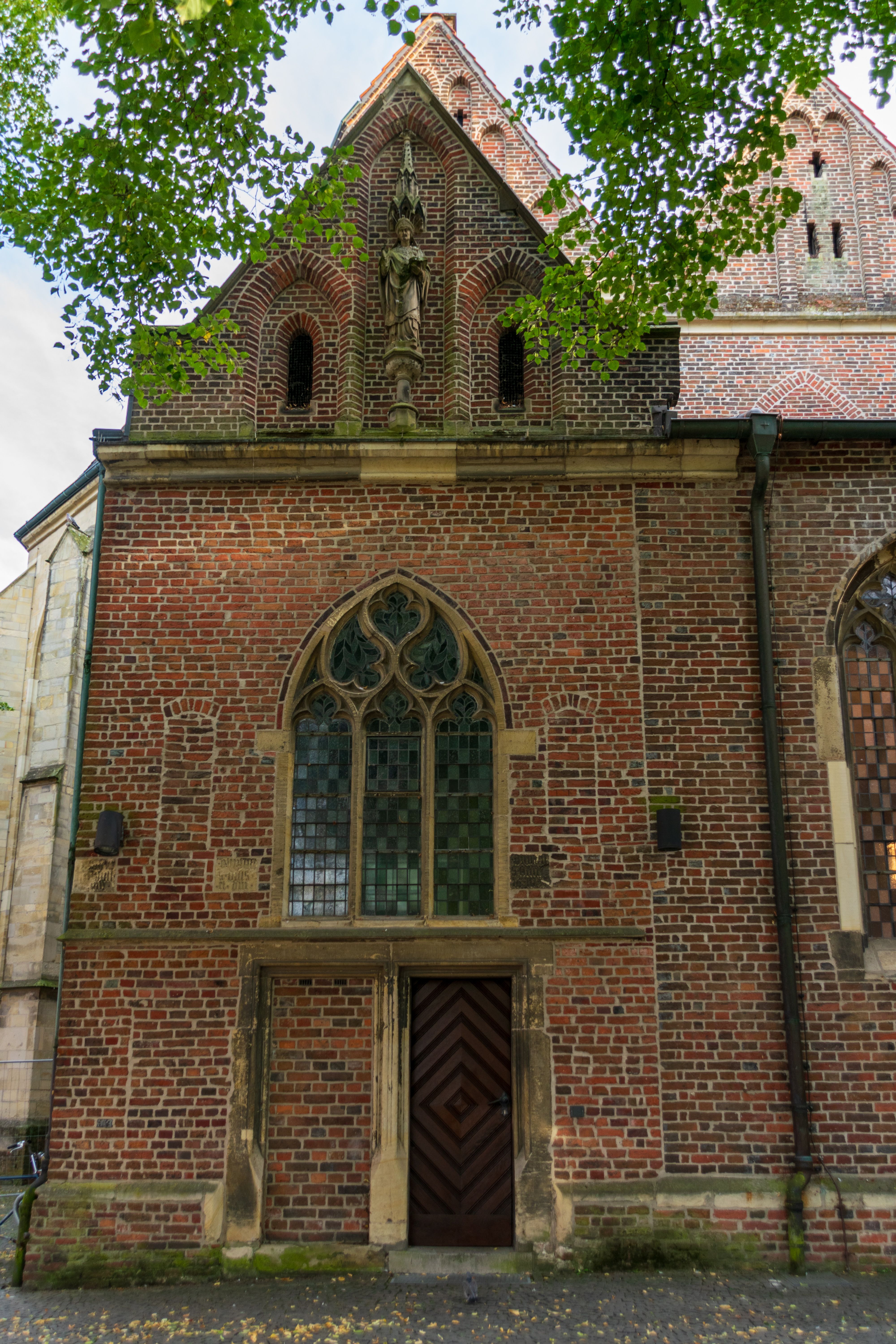 Historic Brick Church with Gothic Architecture · Free Stock Photo