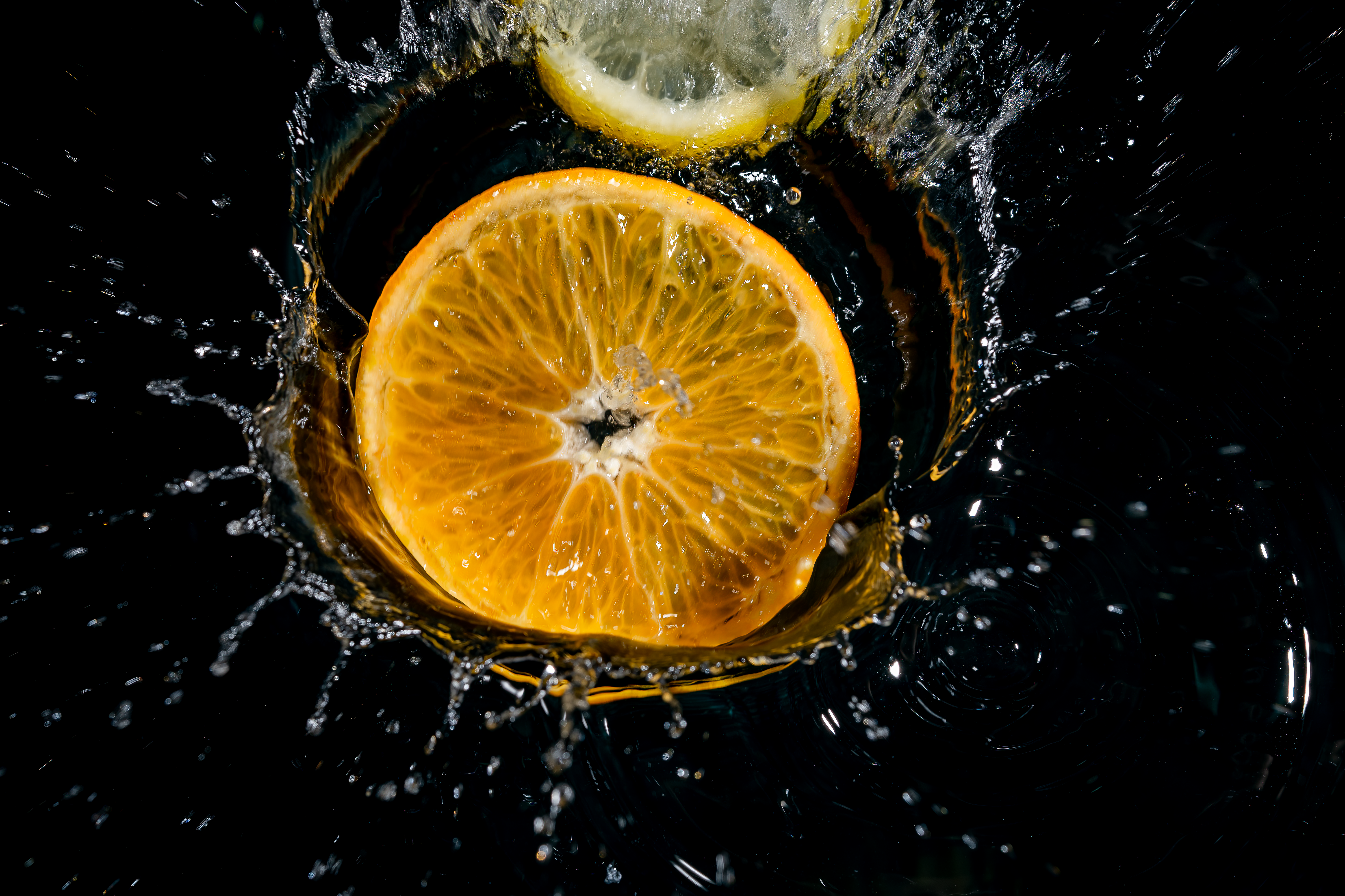 Time Lapse Photography of Orange Fruit on Water · Free Stock Photo