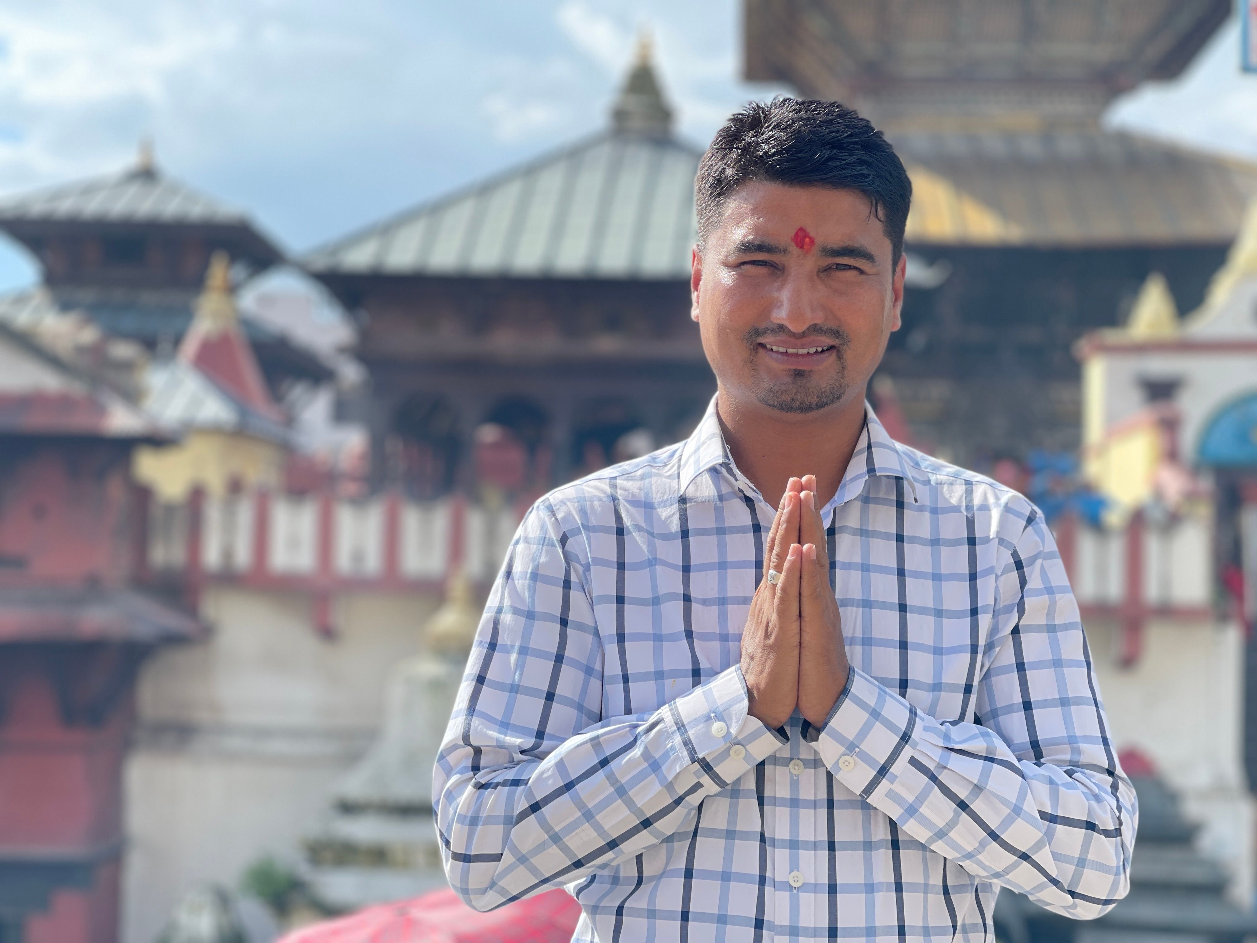 Man with Namaste Gesture at Kathmandu Temple · Free Stock Photo