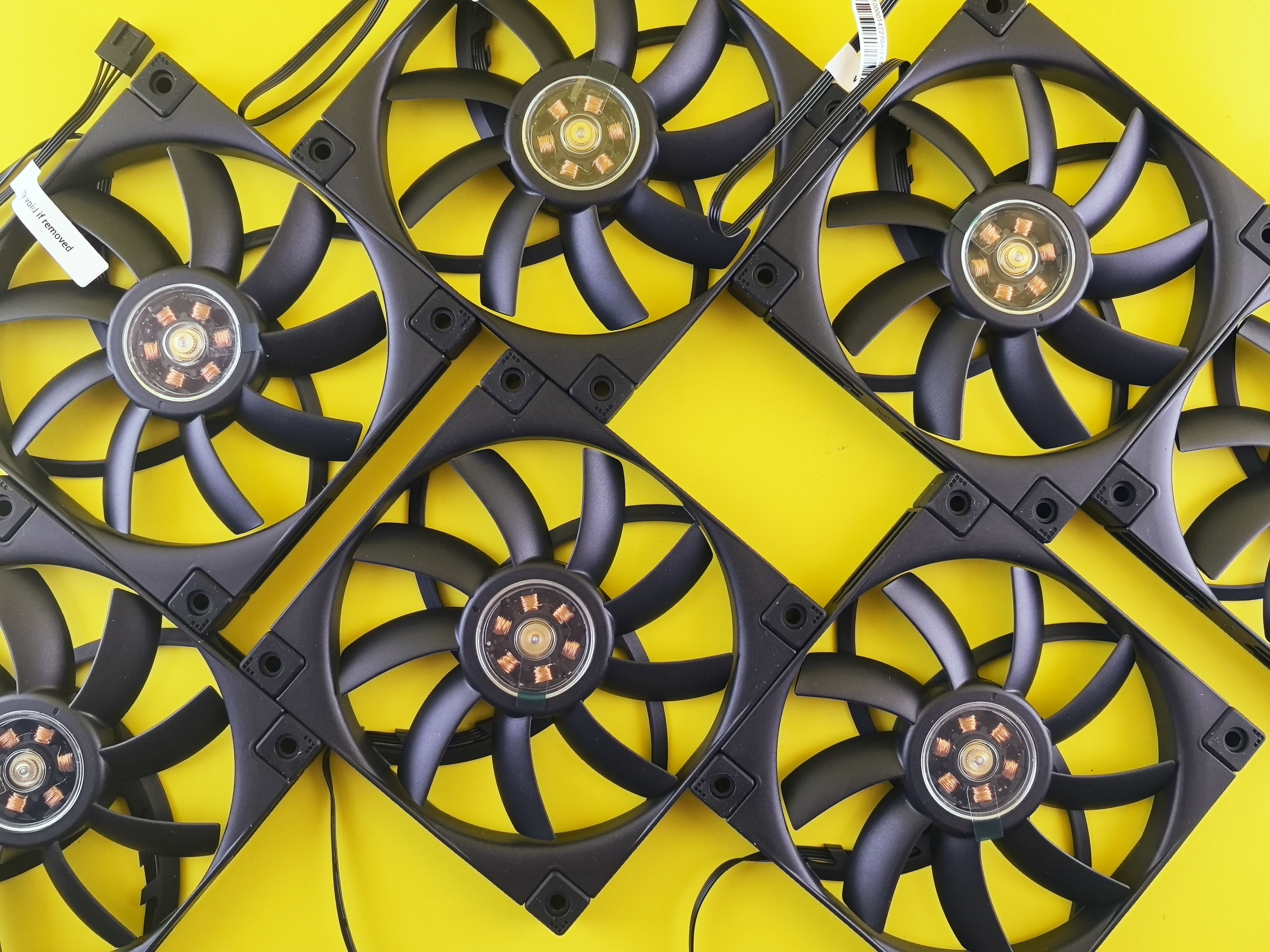Top view of CPU cooling fans on bright yellow background · Free Stock Photo