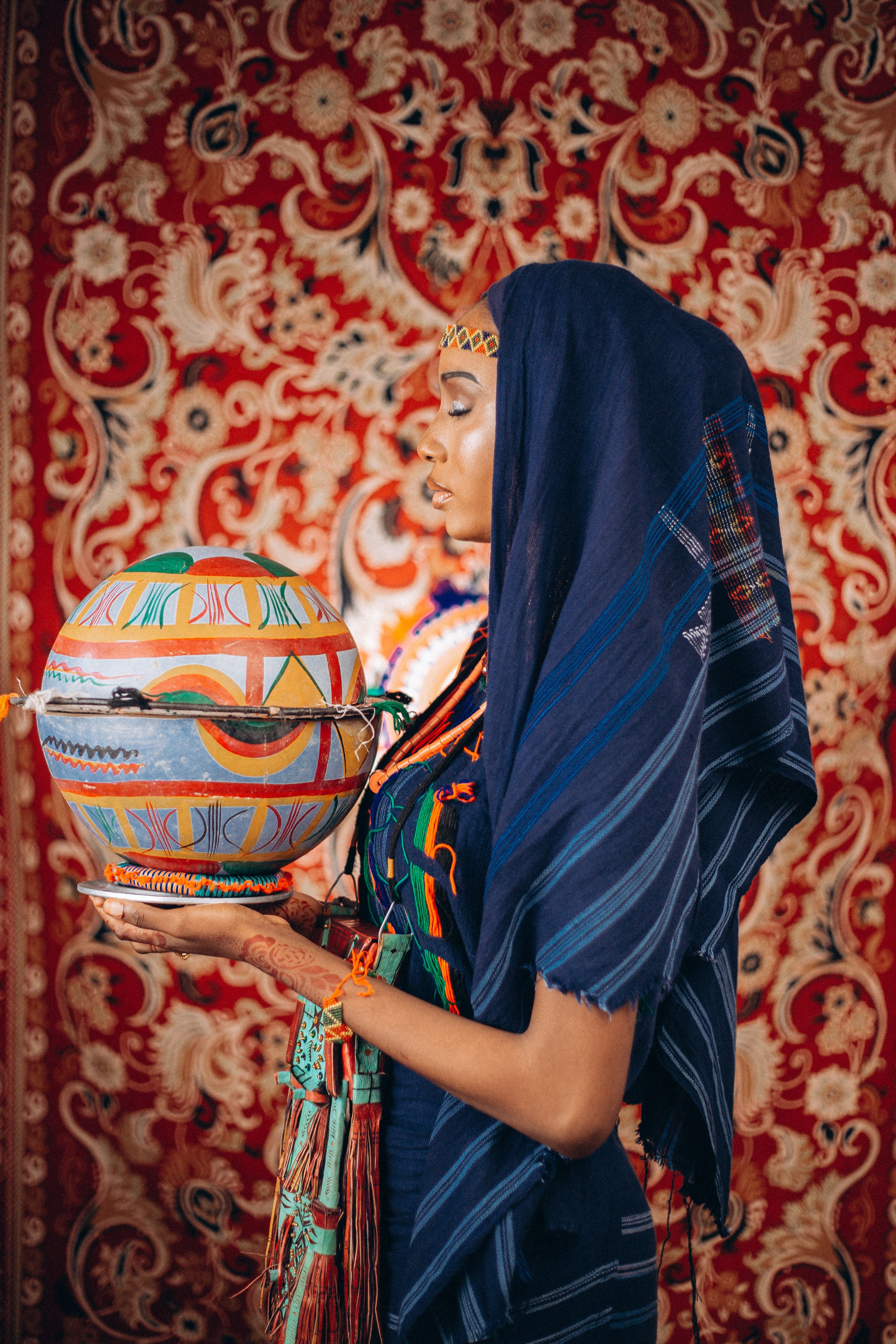 Colorful Traditional Attire in Cultural Setting · Free Stock Photo