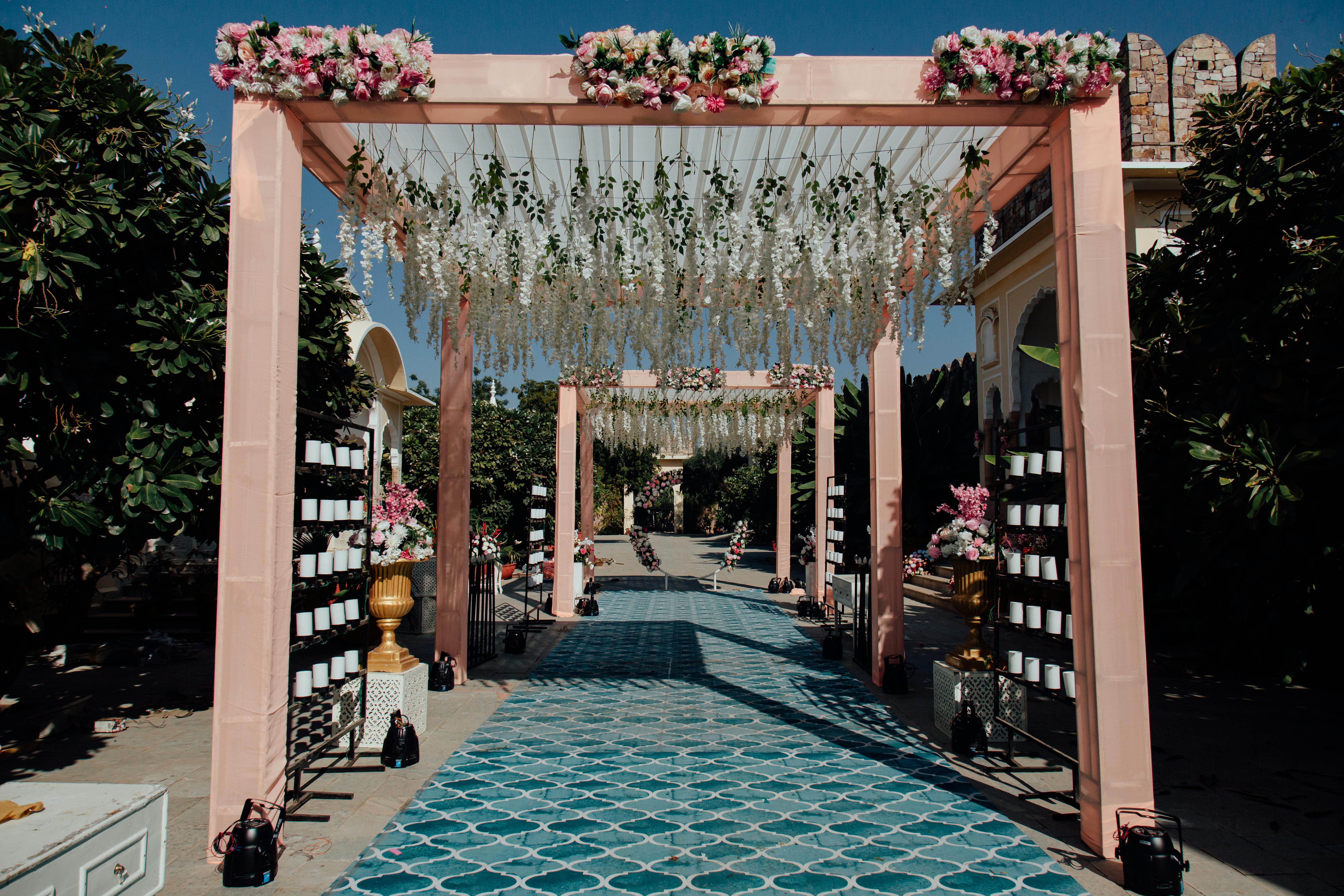 Elegant Outdoor Wedding Aisle Decorated with Flowers · Free Stock Photo