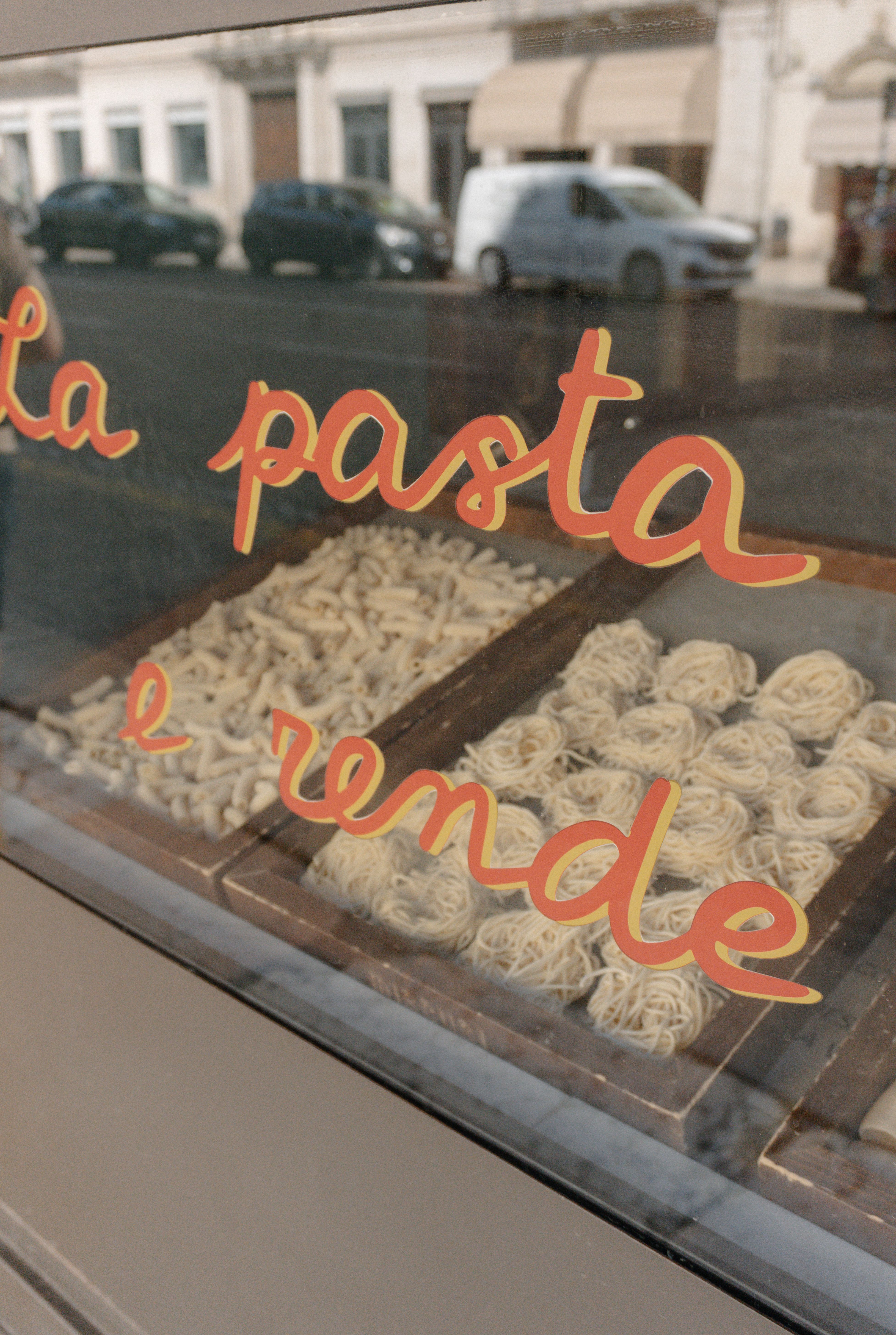 Authentic Italian Pasta Display in Shop Window · Free Stock Photo