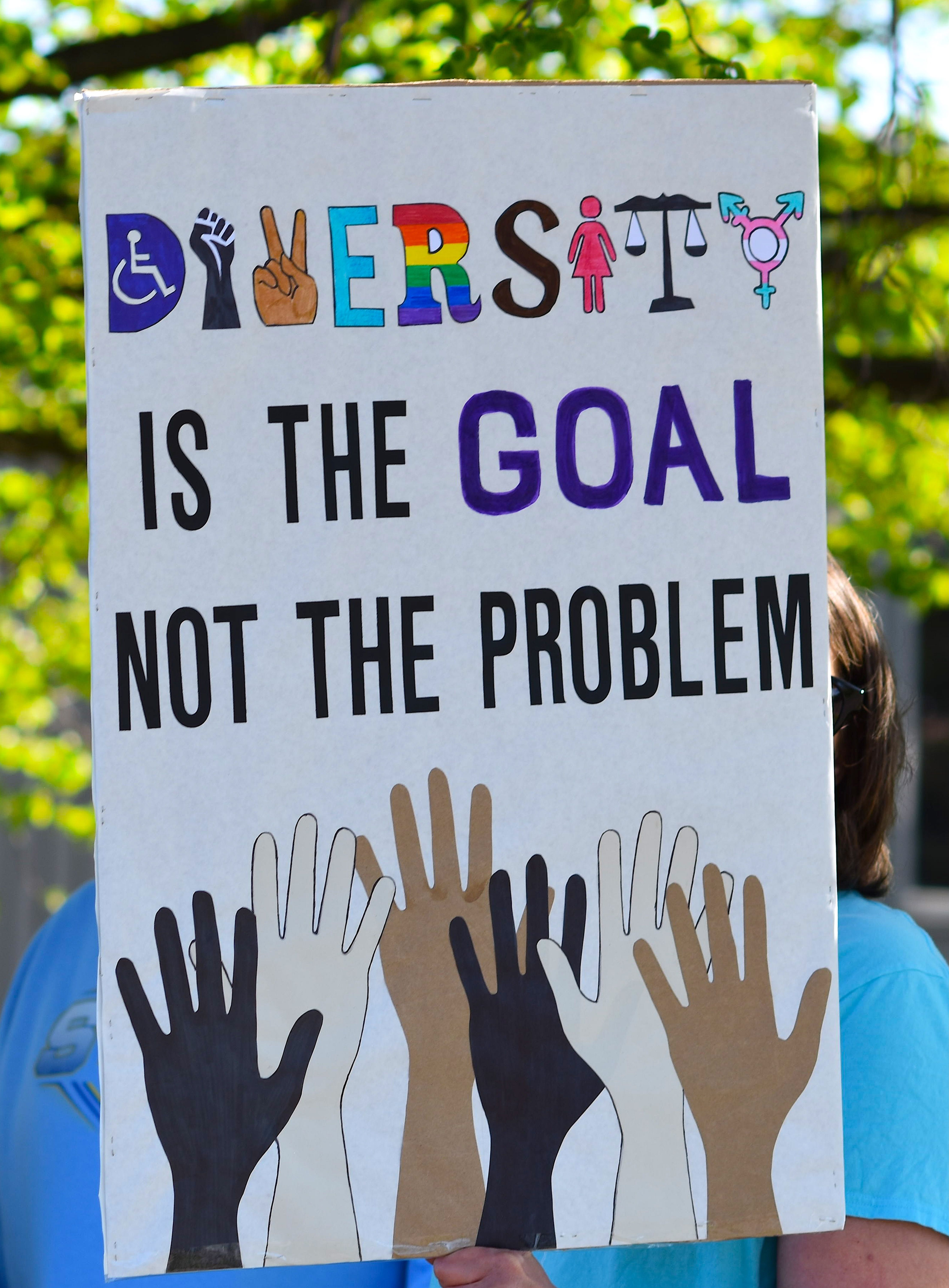 Diversity Sign with Inclusive Symbols and Colors · Free Stock Photo