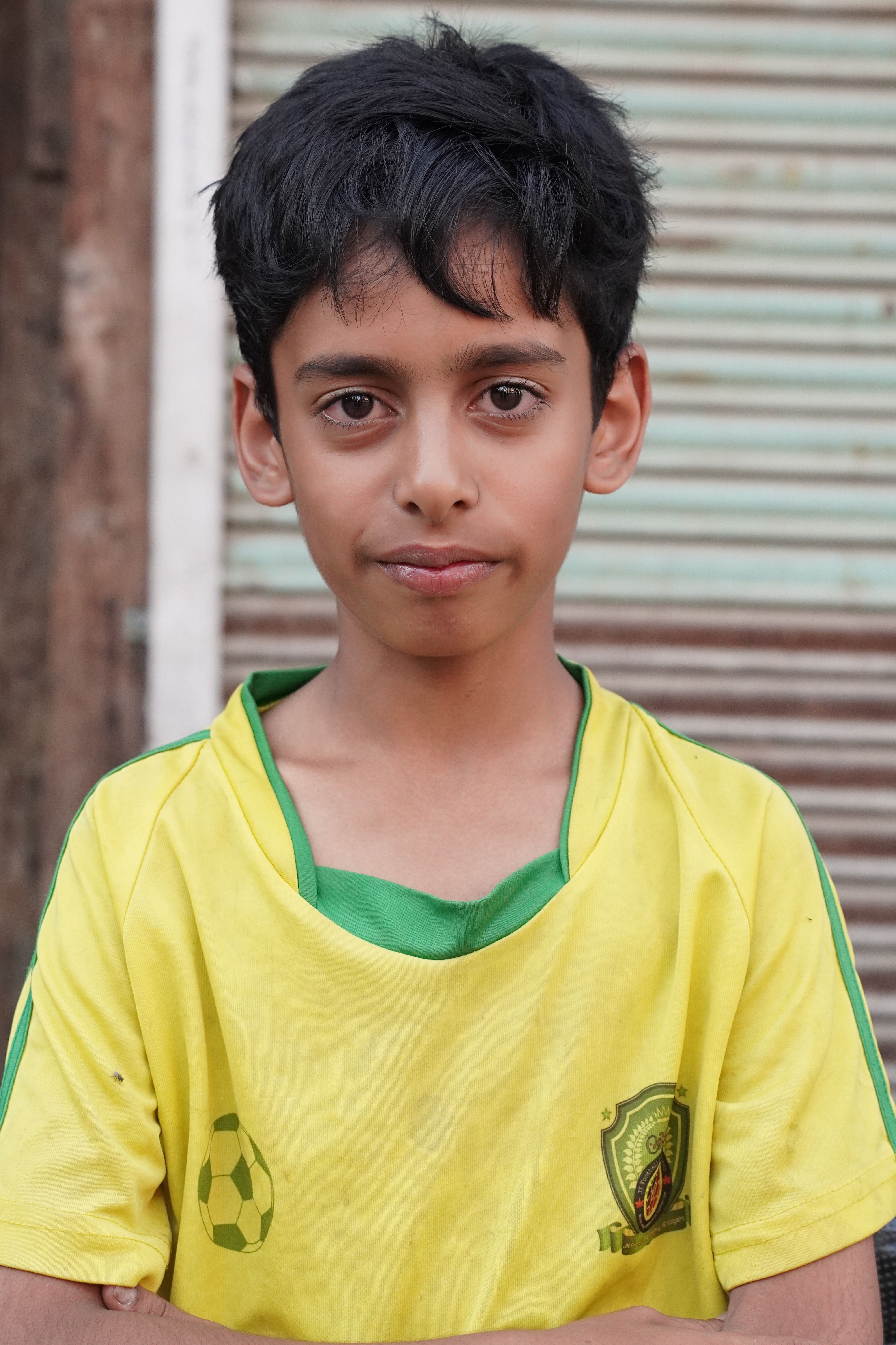 Portrait of Boy in Yellow Sports Jersey Outdoors · Free Stock Photo