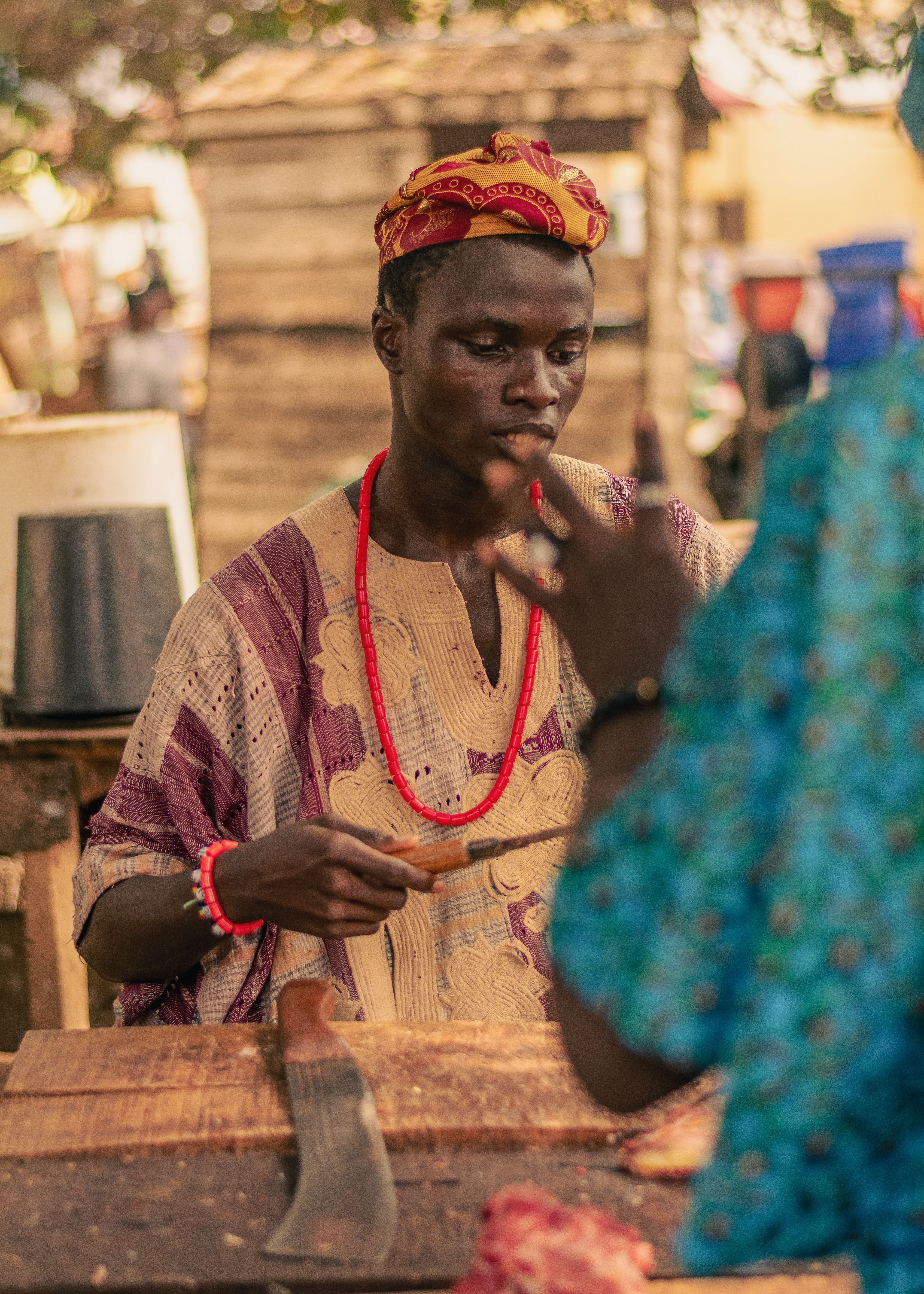 Traditional African Market Scene with Butcher · Free Stock Photo