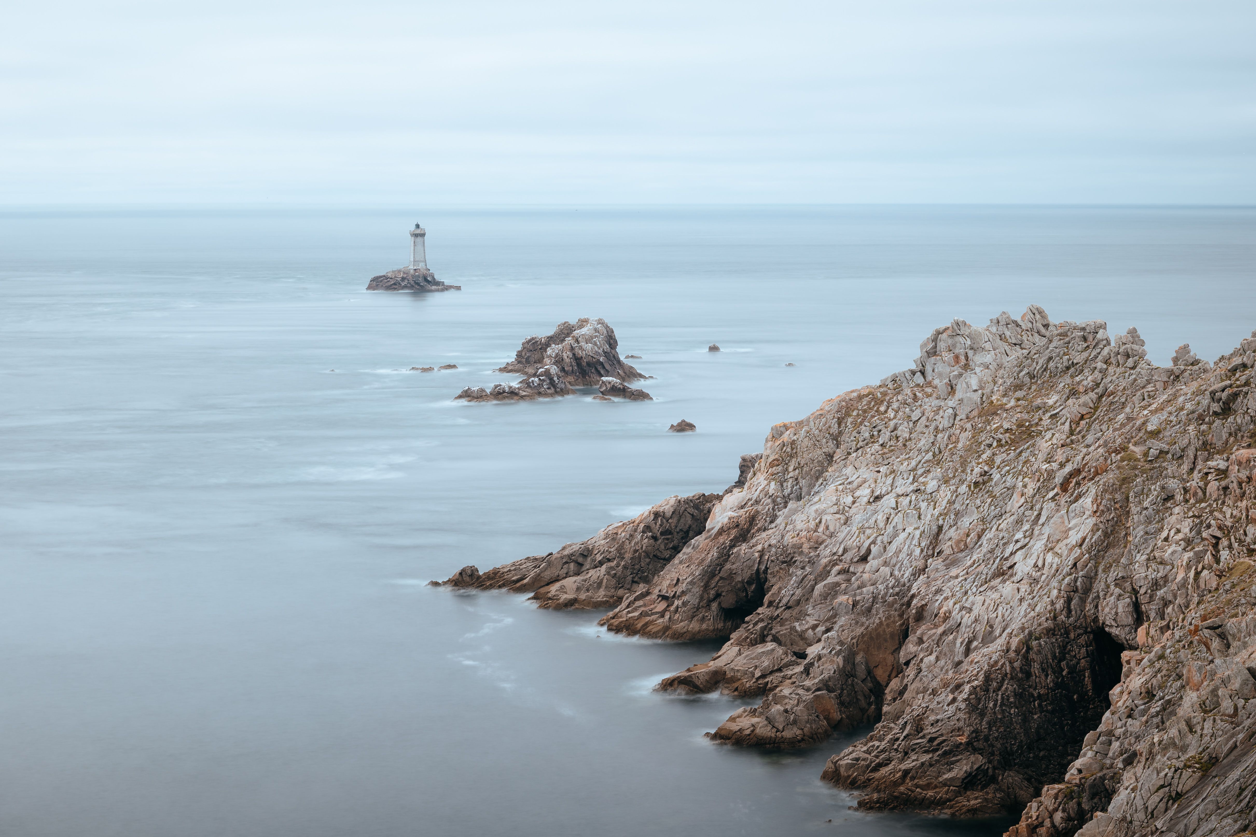 Dramatic Coastal Landscape with Lighthouse · Free Stock Photo