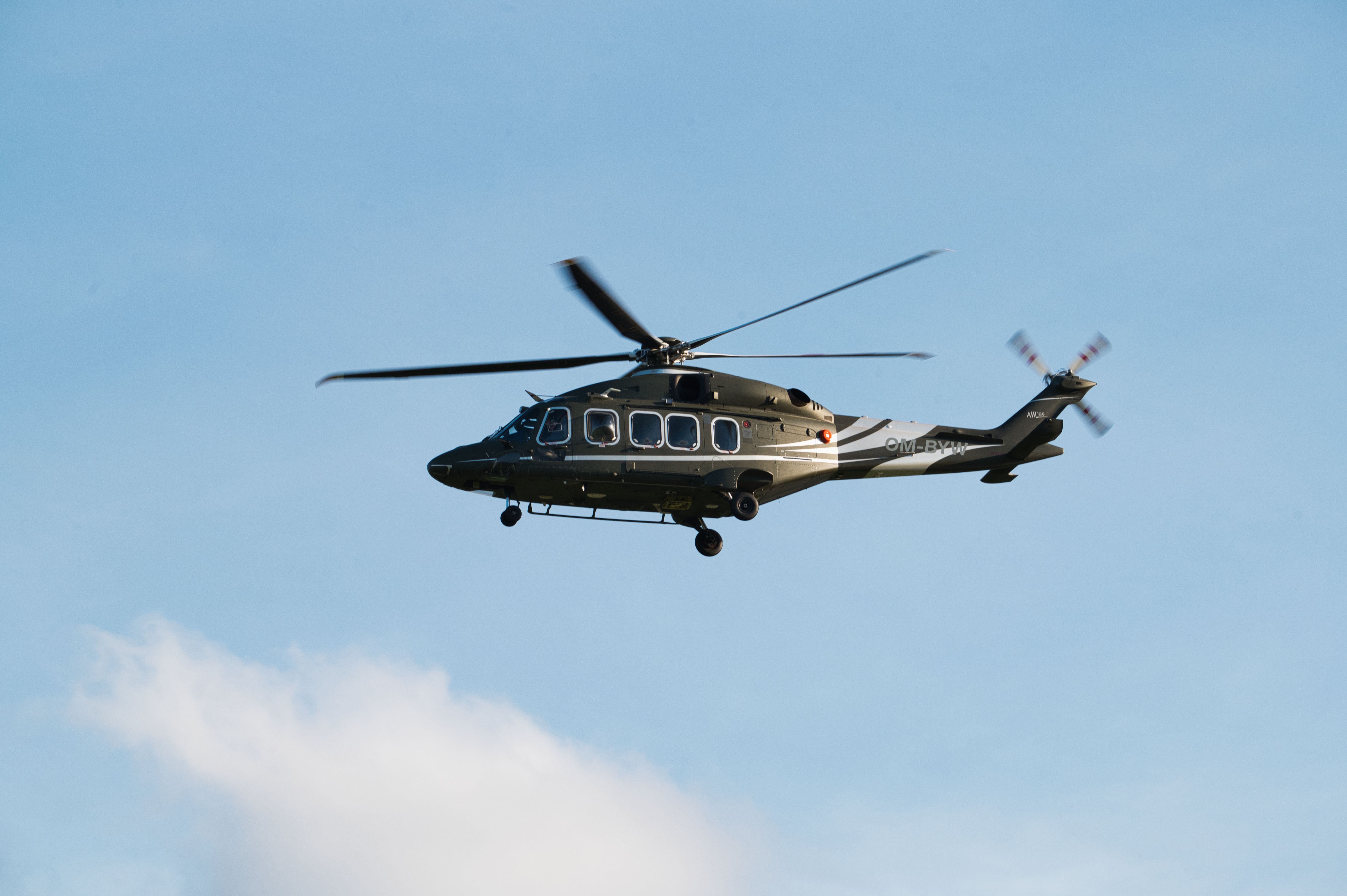 Medium Size Helicopter Hovering in Clear Sky · Free Stock Photo