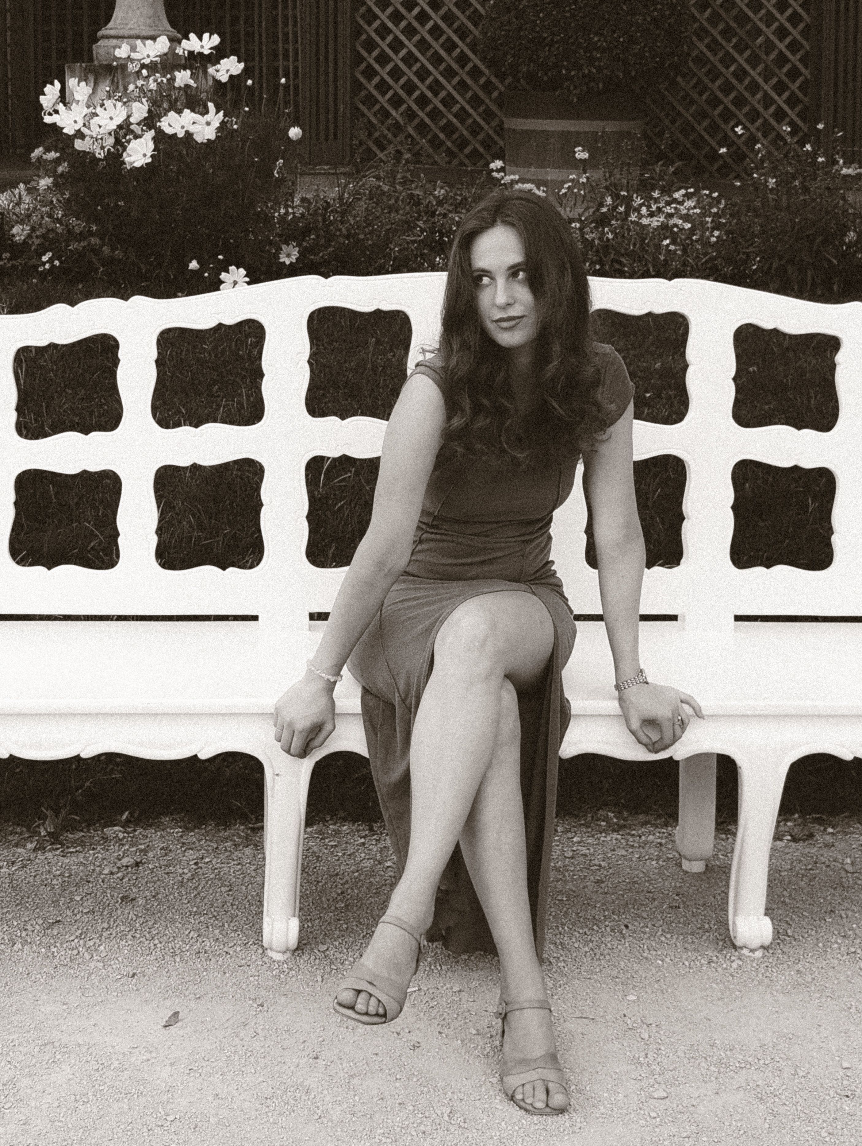 Elegant Woman Posing on Bench in Bayreuth · Free Stock Photo