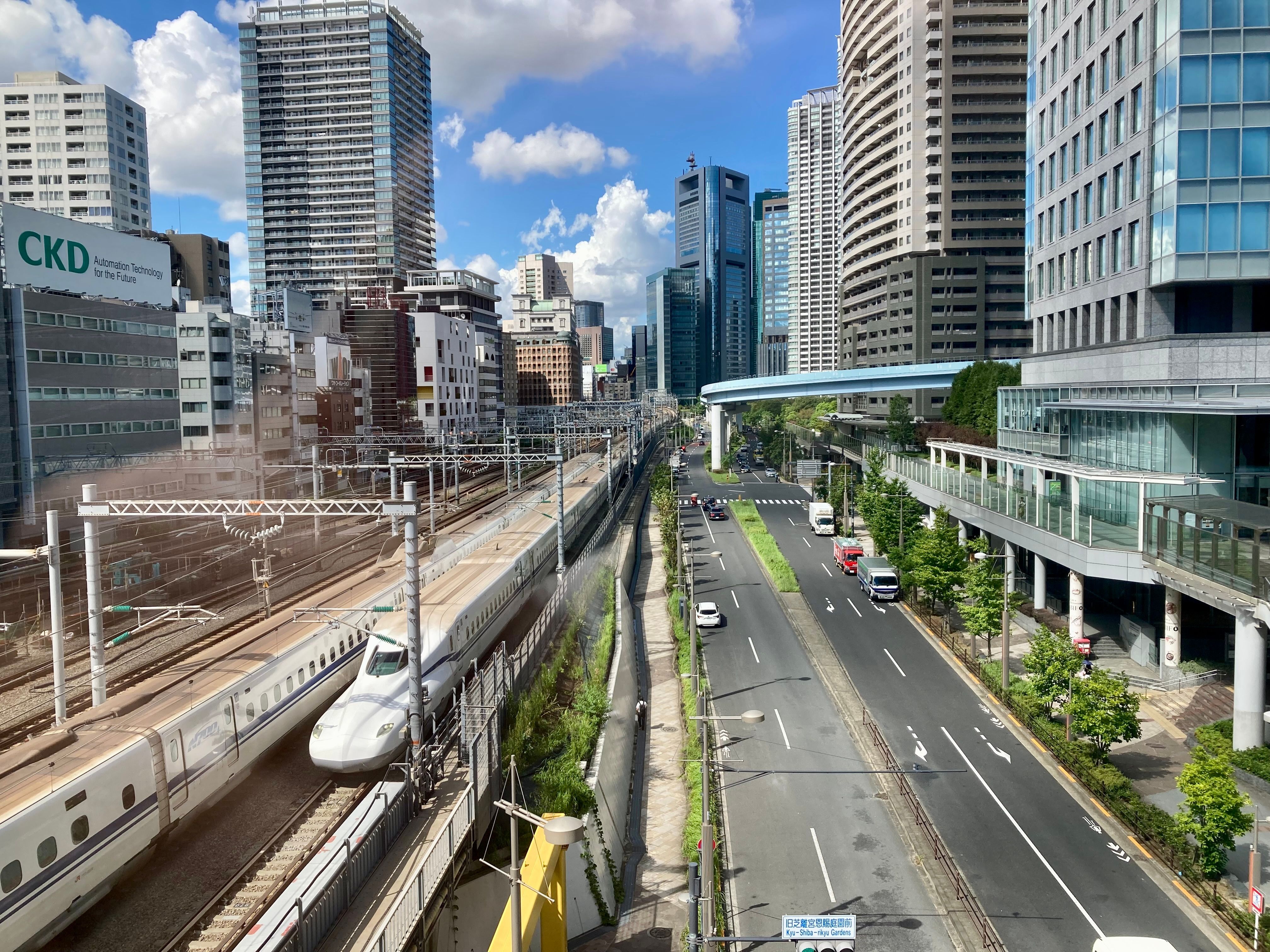 Tokyo Urban Expanse with Shinkansen Train · Free Stock Photo