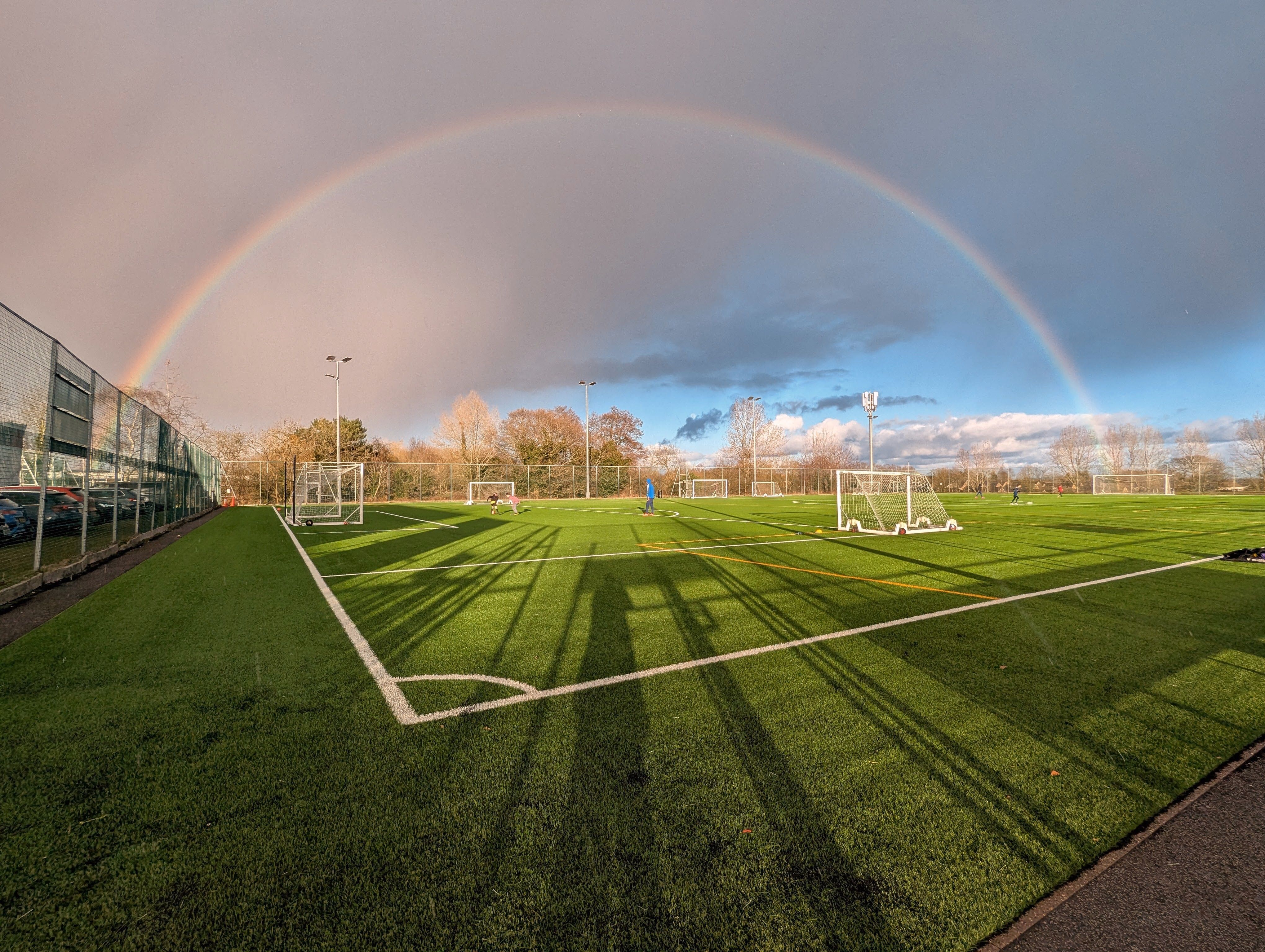Rainbow Over Empty Soccer Field in Late Fall · Free Stock Photo