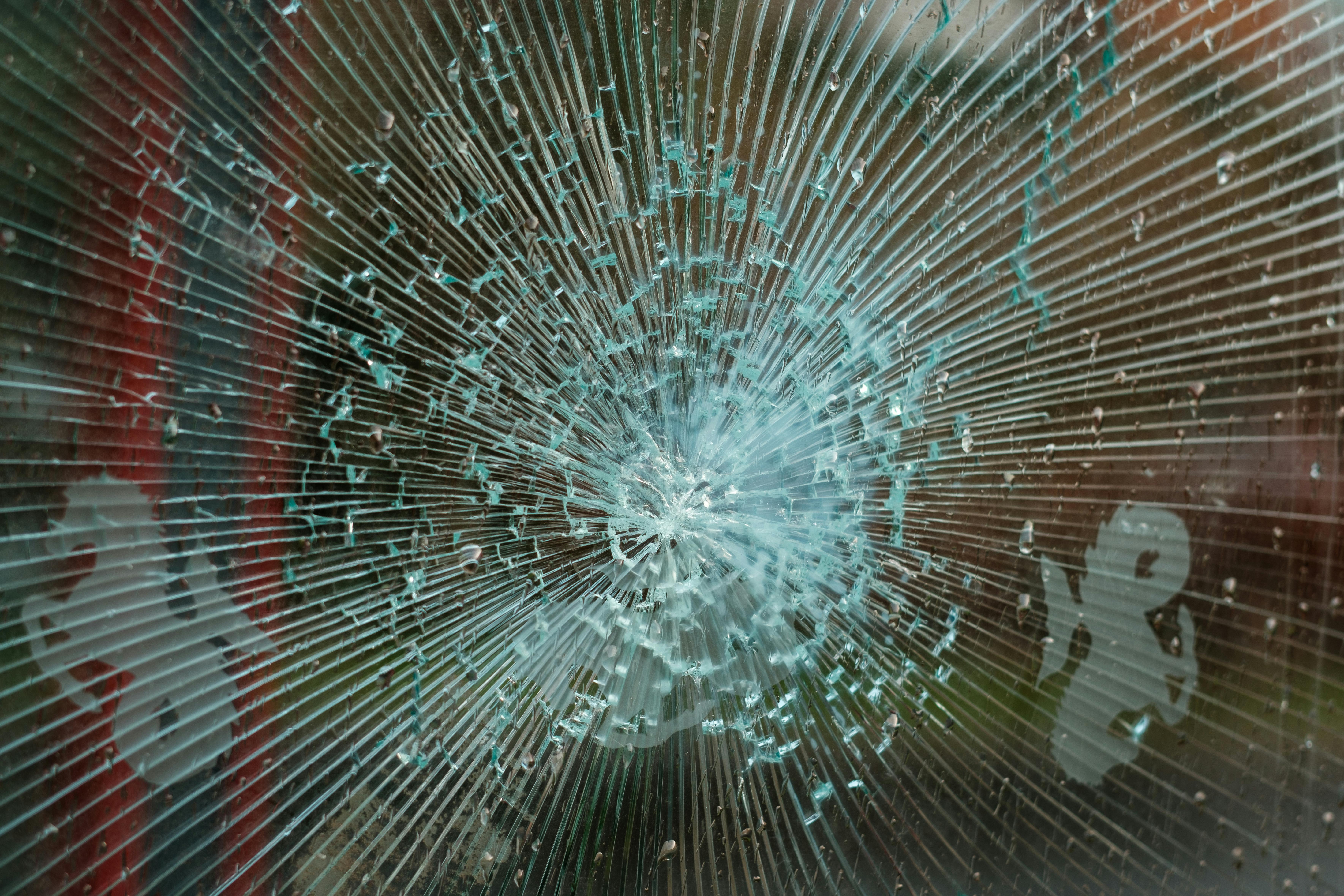 Free Detailed view of shattered glass creating an abstract pattern of ...