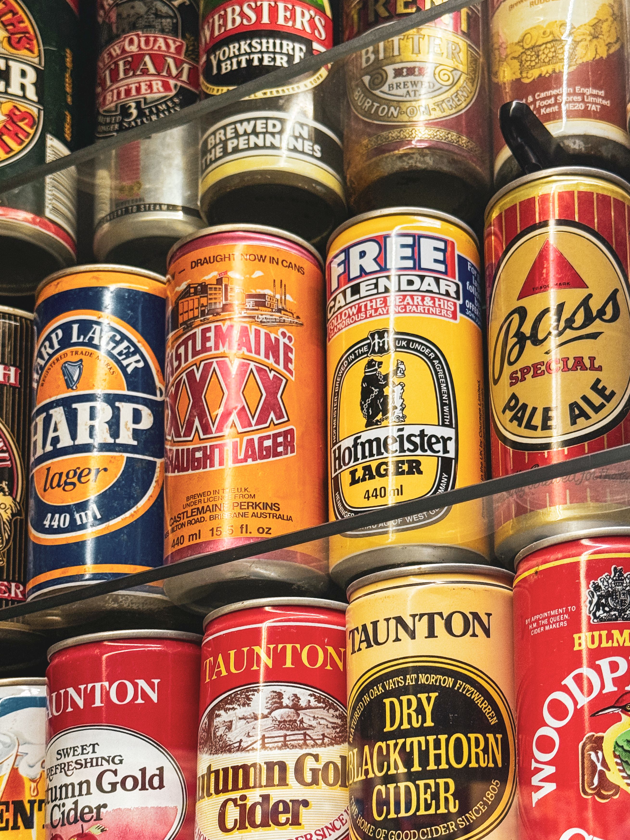 Vintage Beer and Cider Cans Display in England · Free Stock Photo