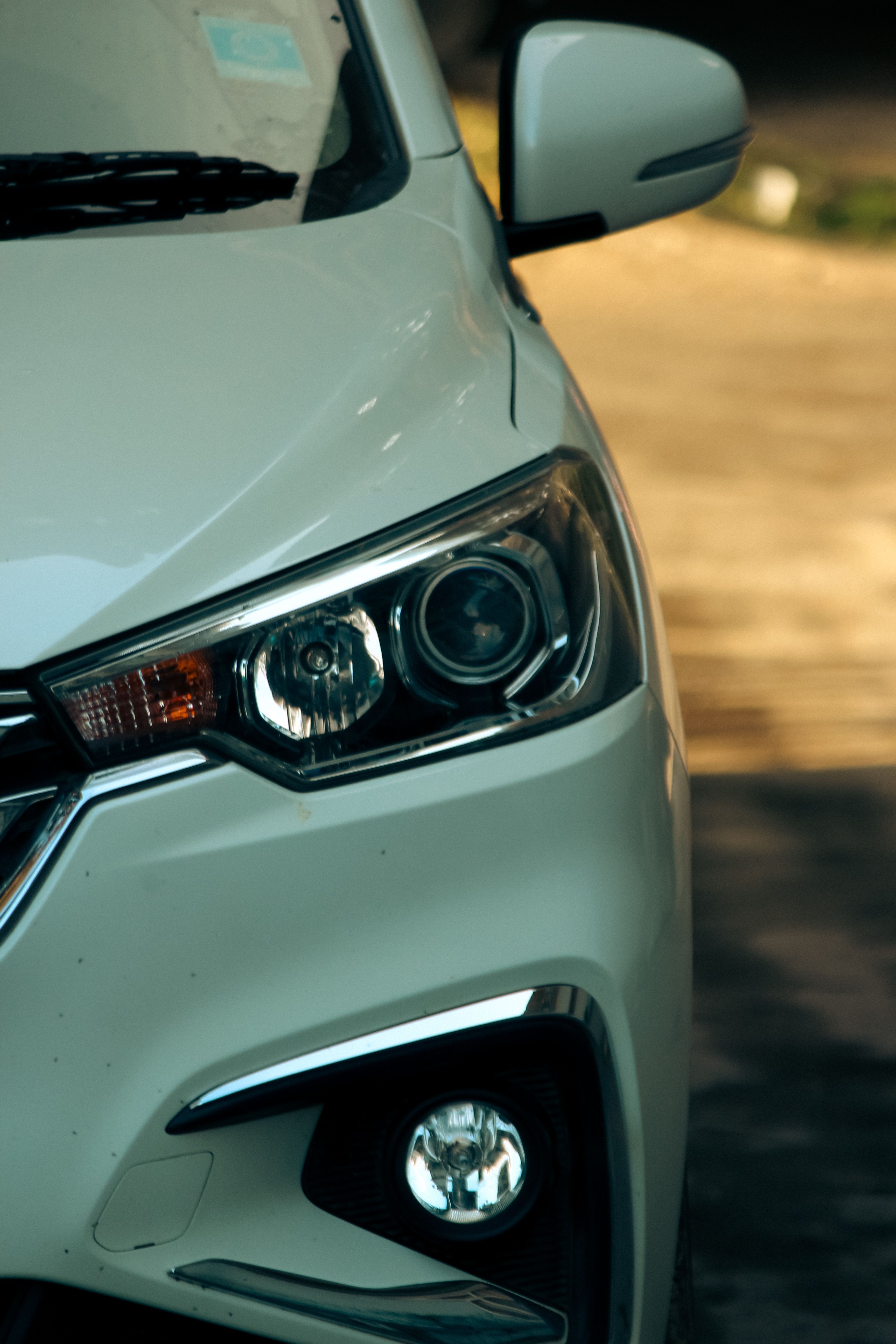 Close-Up of White Car Headlight Design · Free Stock Photo
