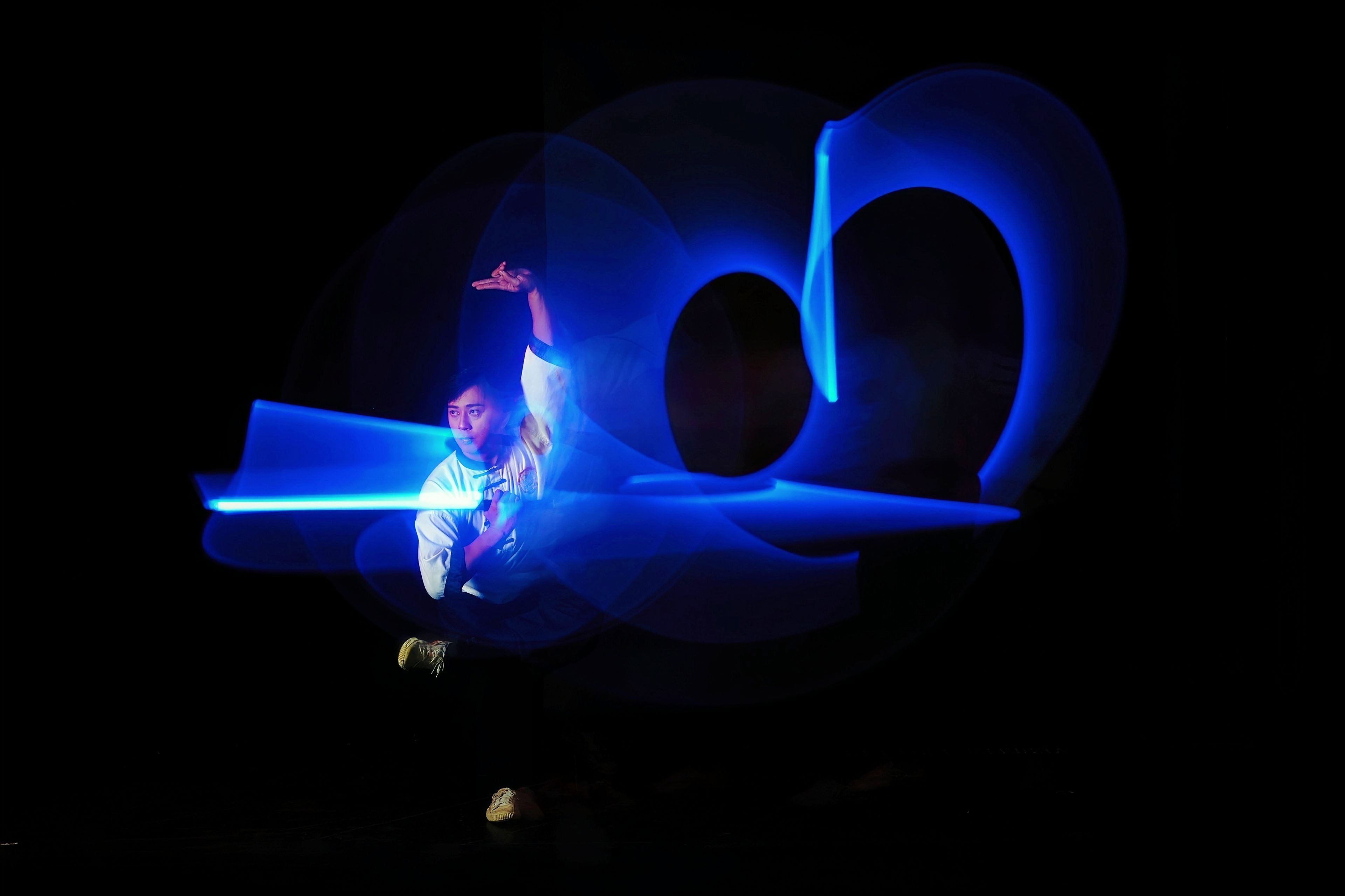Dynamic Light Painting with Human Performer · Free Stock Photo