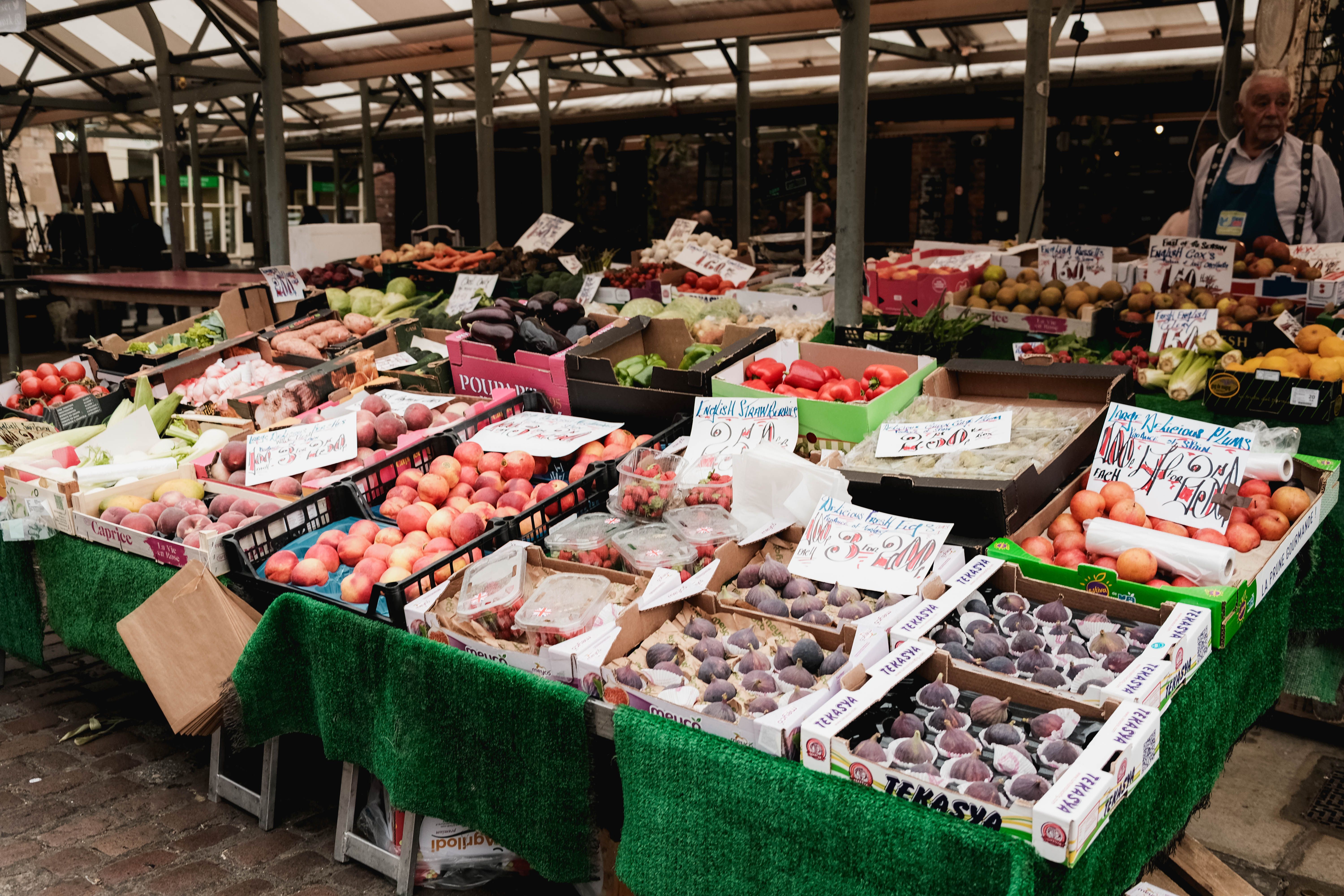 Vibrant Local Market Stall with Fresh Produce · Free Stock Photo