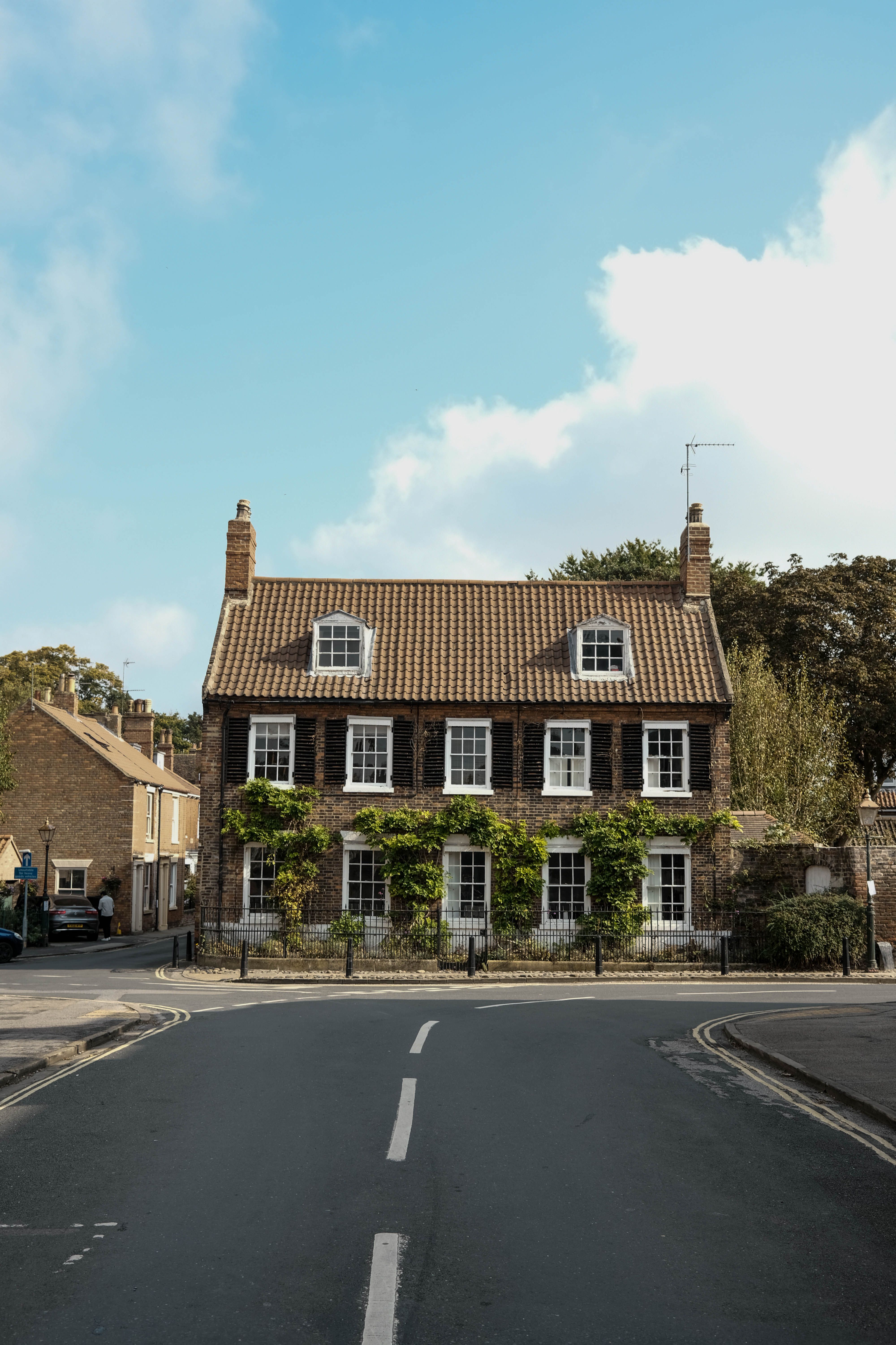 Charming English Brick House in Suburban Setting · Free Stock Photo