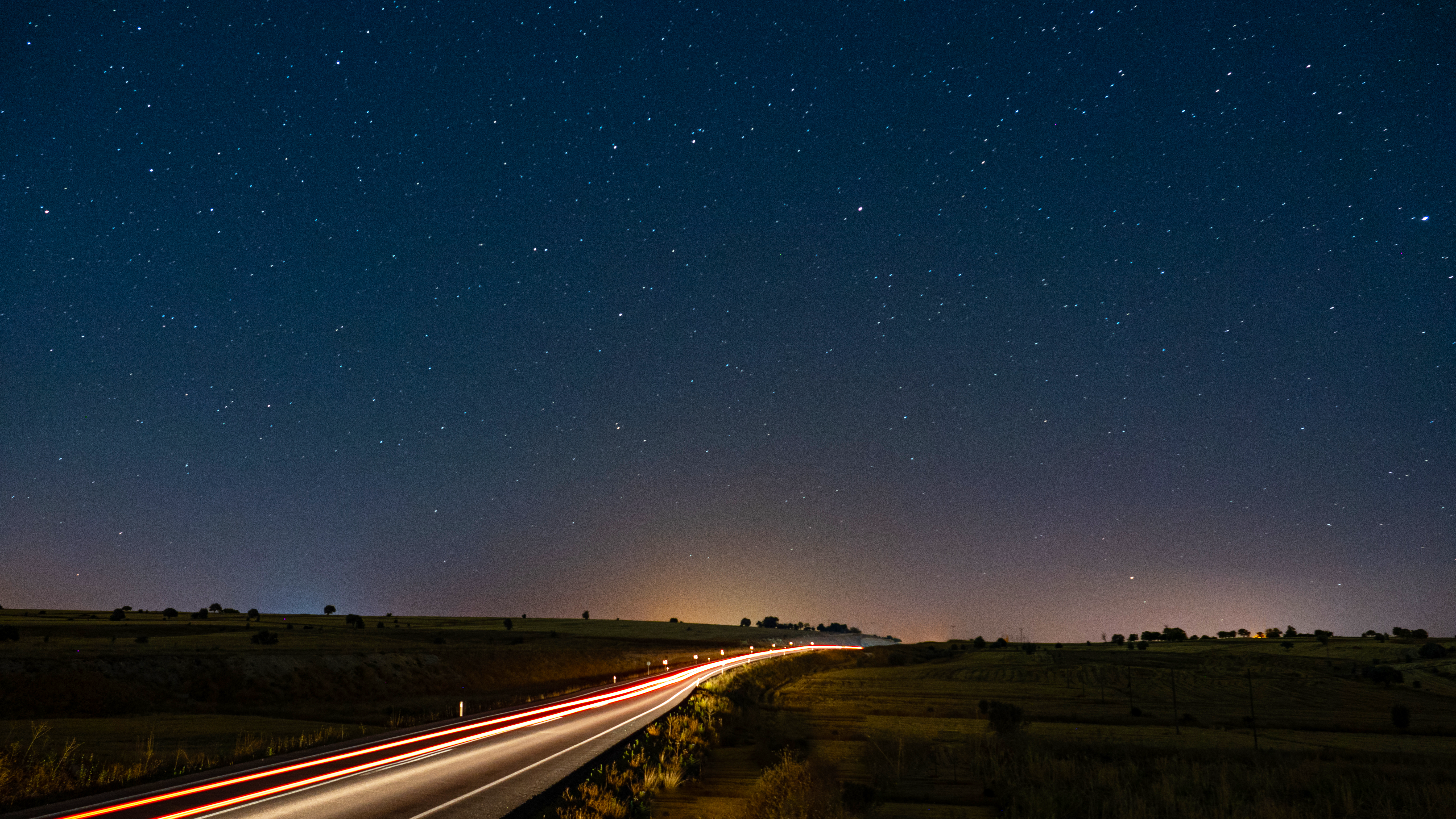 Starry Night Sky Over Quiet Country Road · Free Stock Photo
