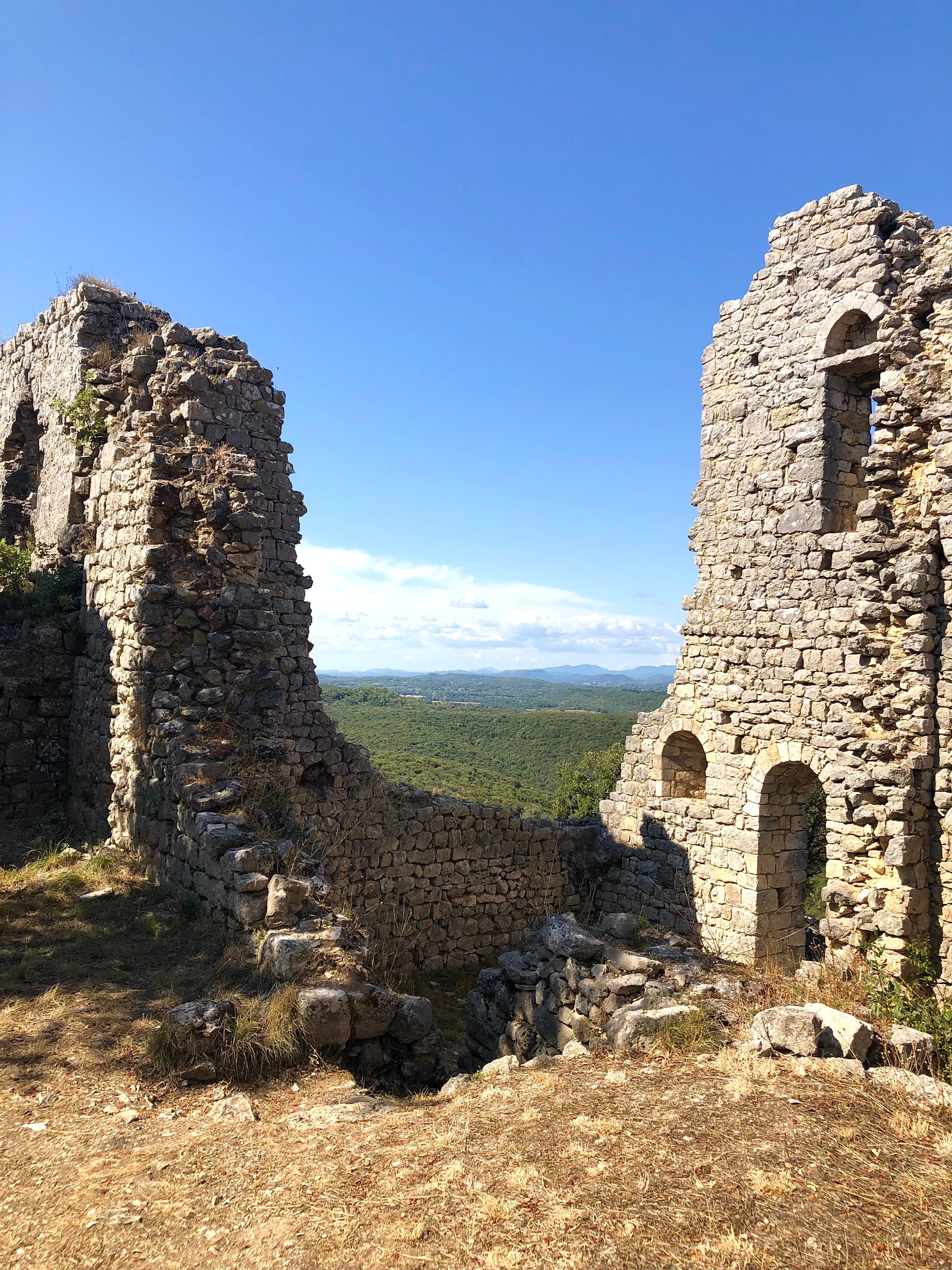 Ancient Stone Fort Overlooking Lush Forests · Free Stock Photo