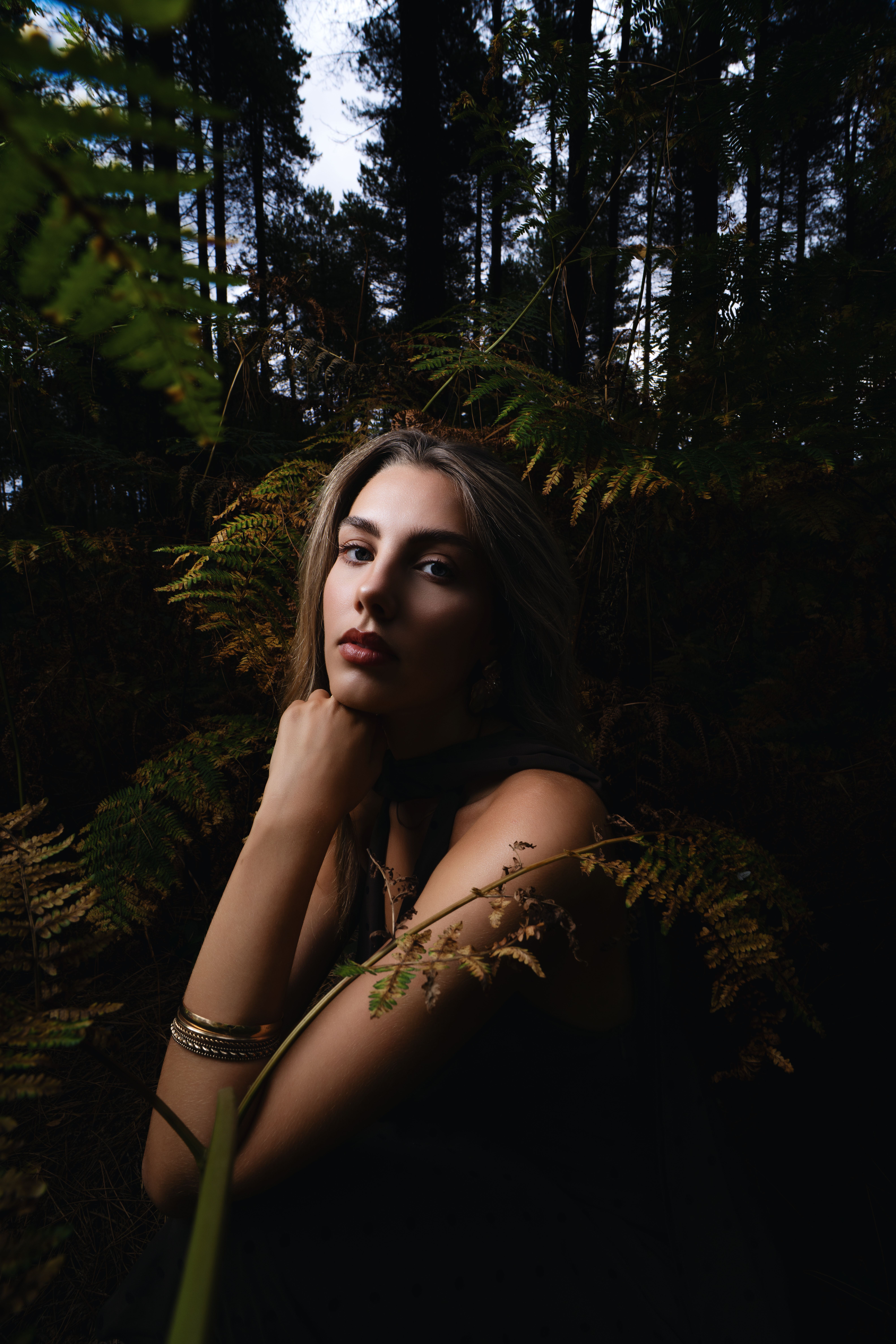 Cinematic Fashion Portrait in Forest Setting · Free Stock Photo