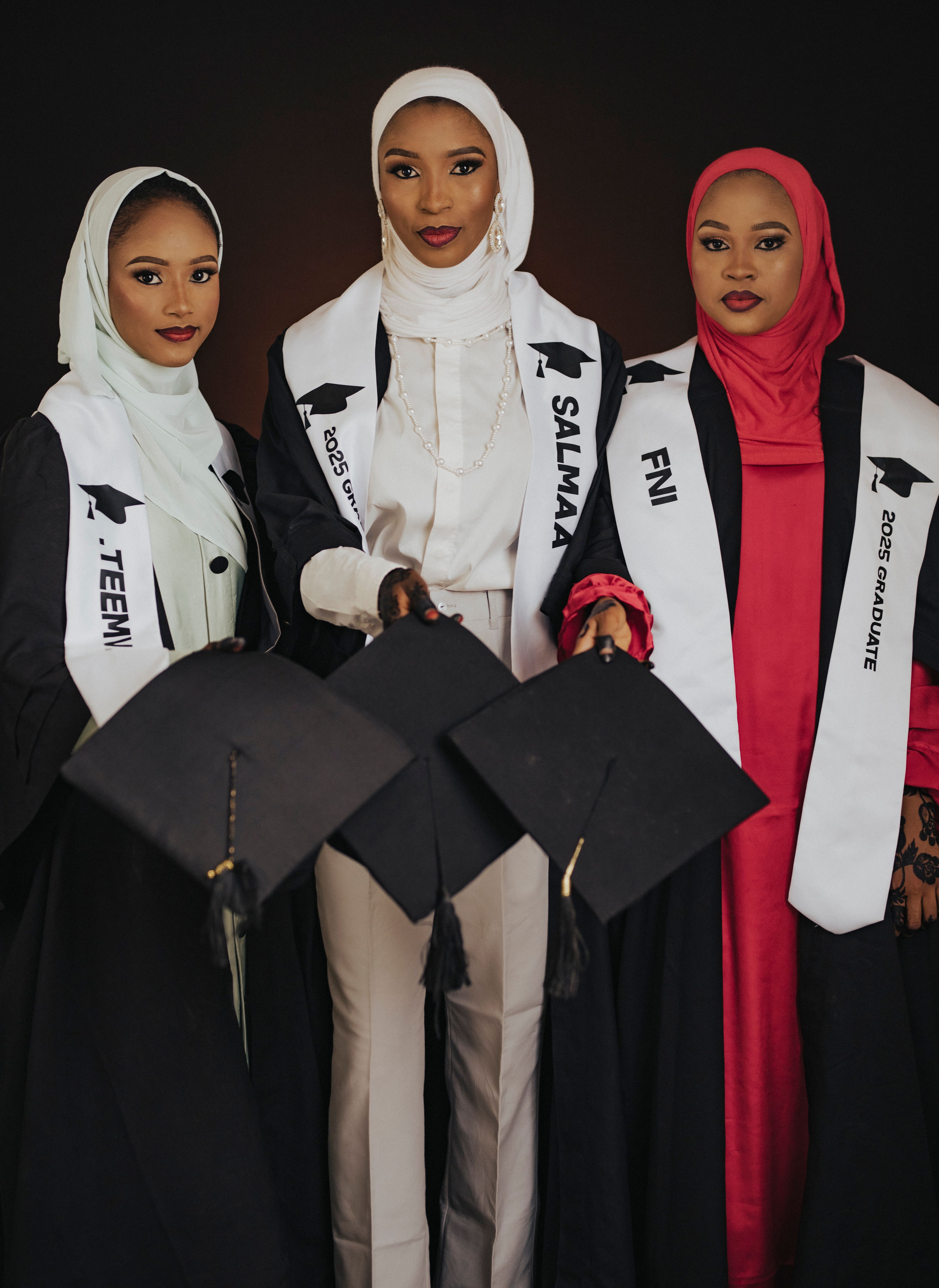 Diverse Female Graduates Celebrating Achievement · Free Stock Photo
