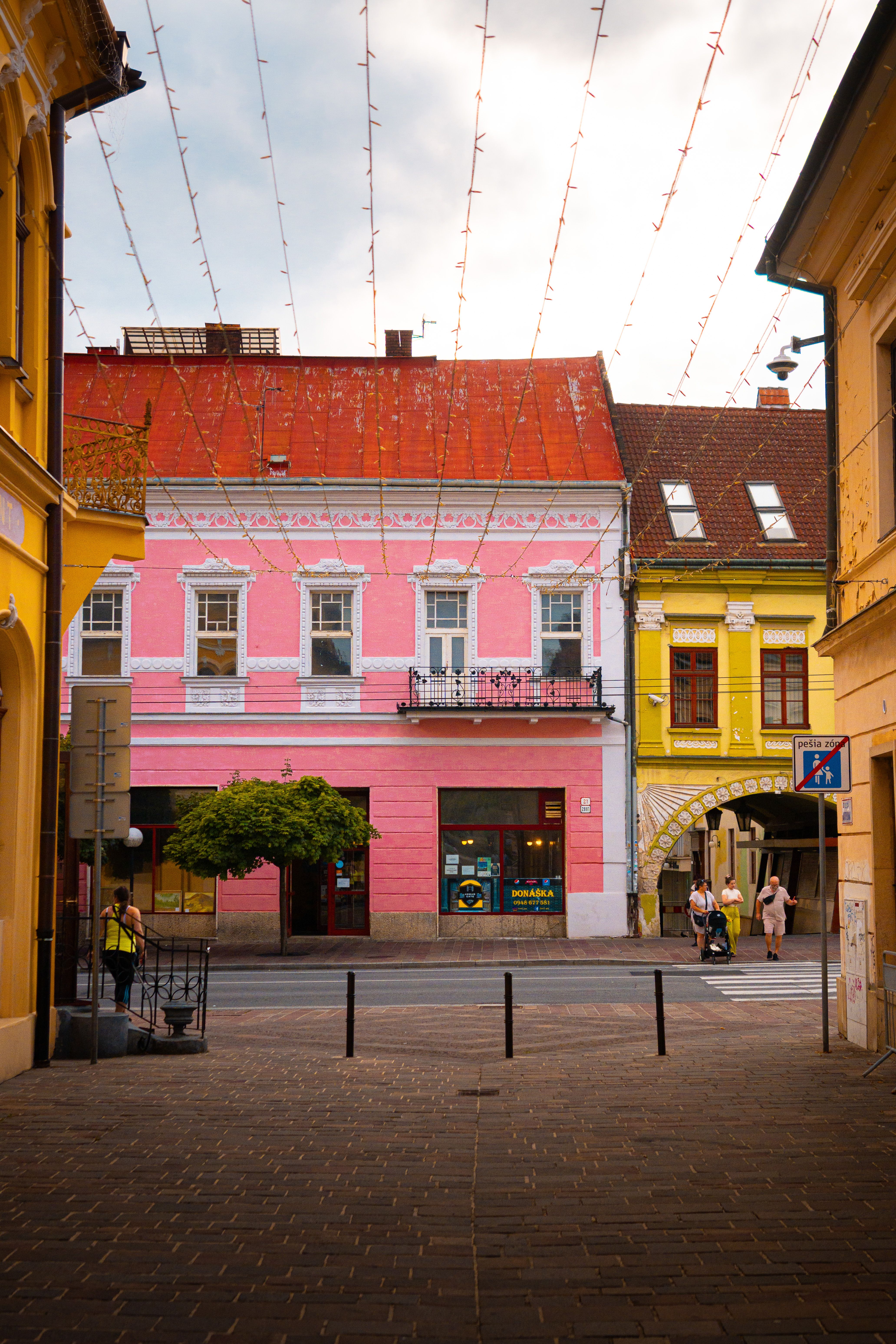 Colorful European Street Scene with Historic Buildings · Free Stock Photo