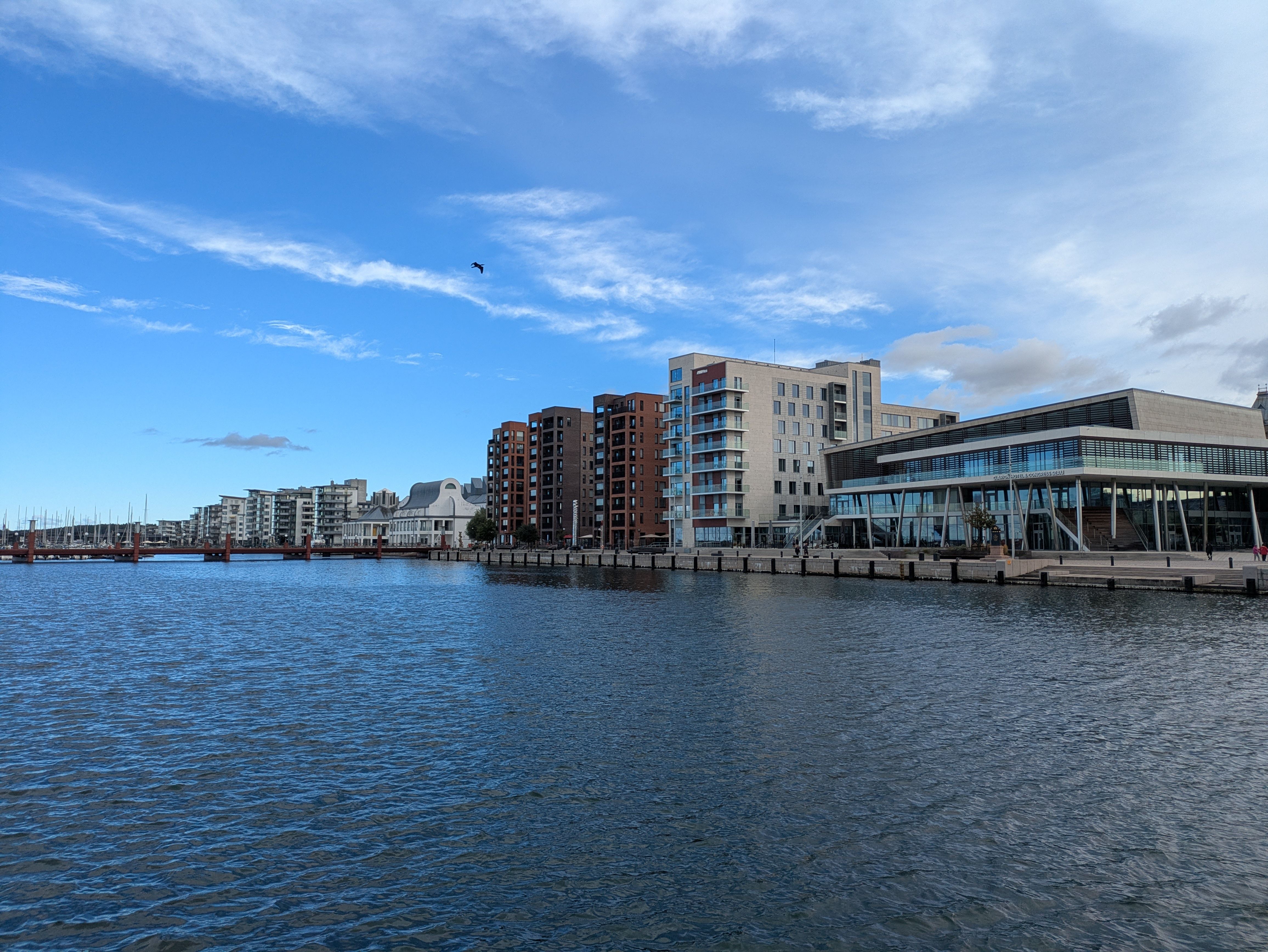 Modern Waterfront Architecture Against Blue Sky · Free Stock Photo