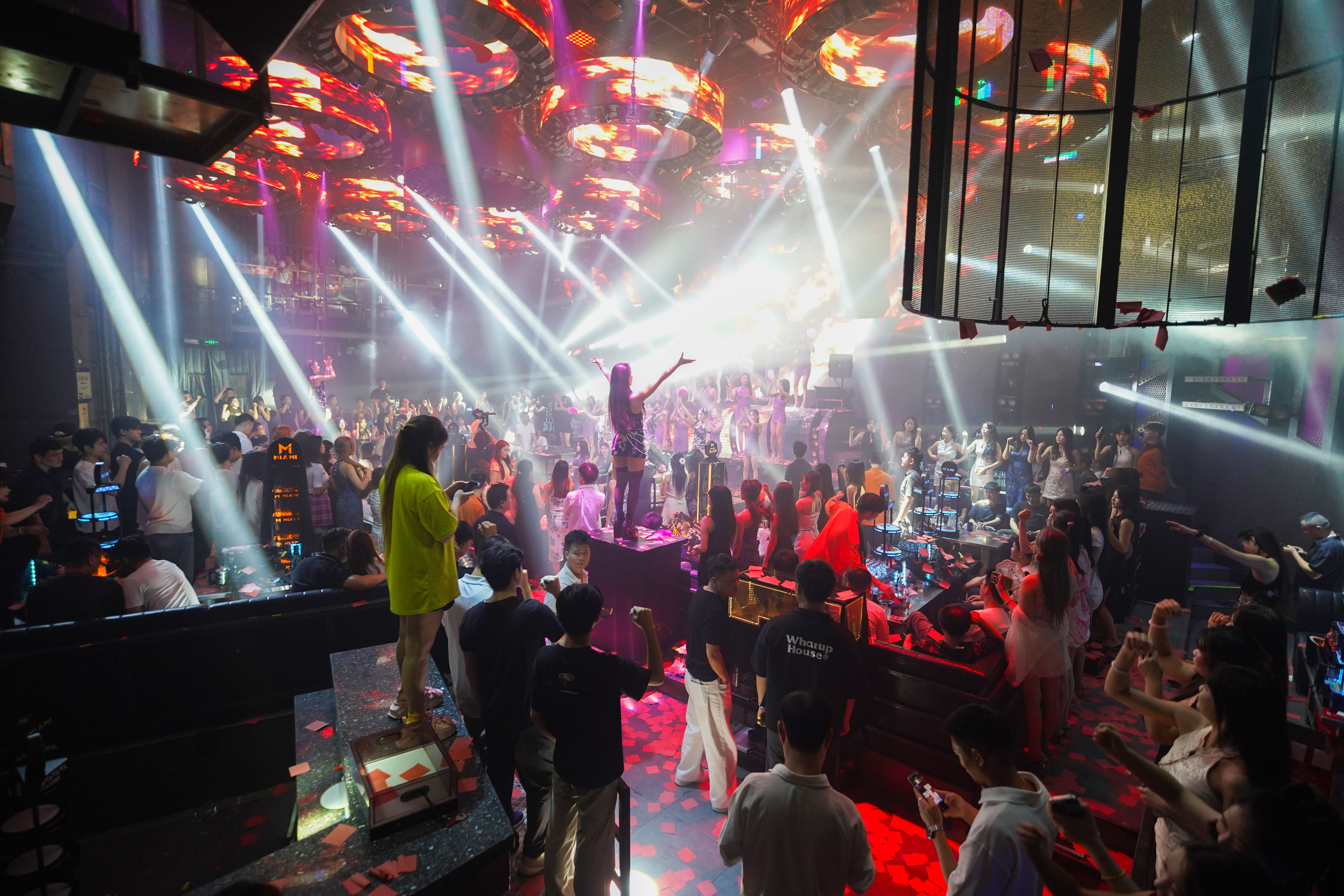 Vibrant Nightclub Scene with Dynamic Lighting · Free Stock Photo
