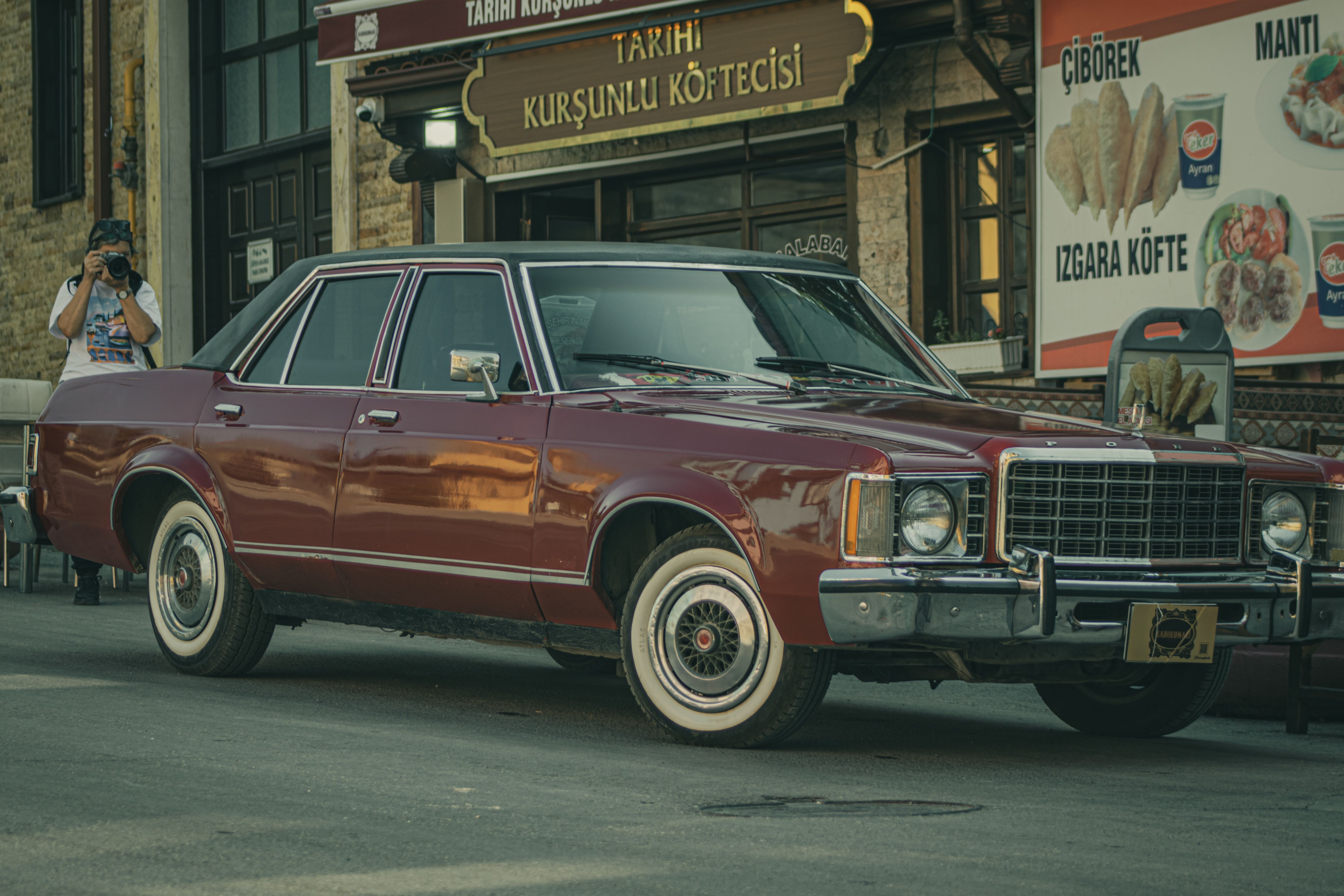 Vintage Black Volga GAZ-24 Car Parked on a City Street · Free Stock Photo