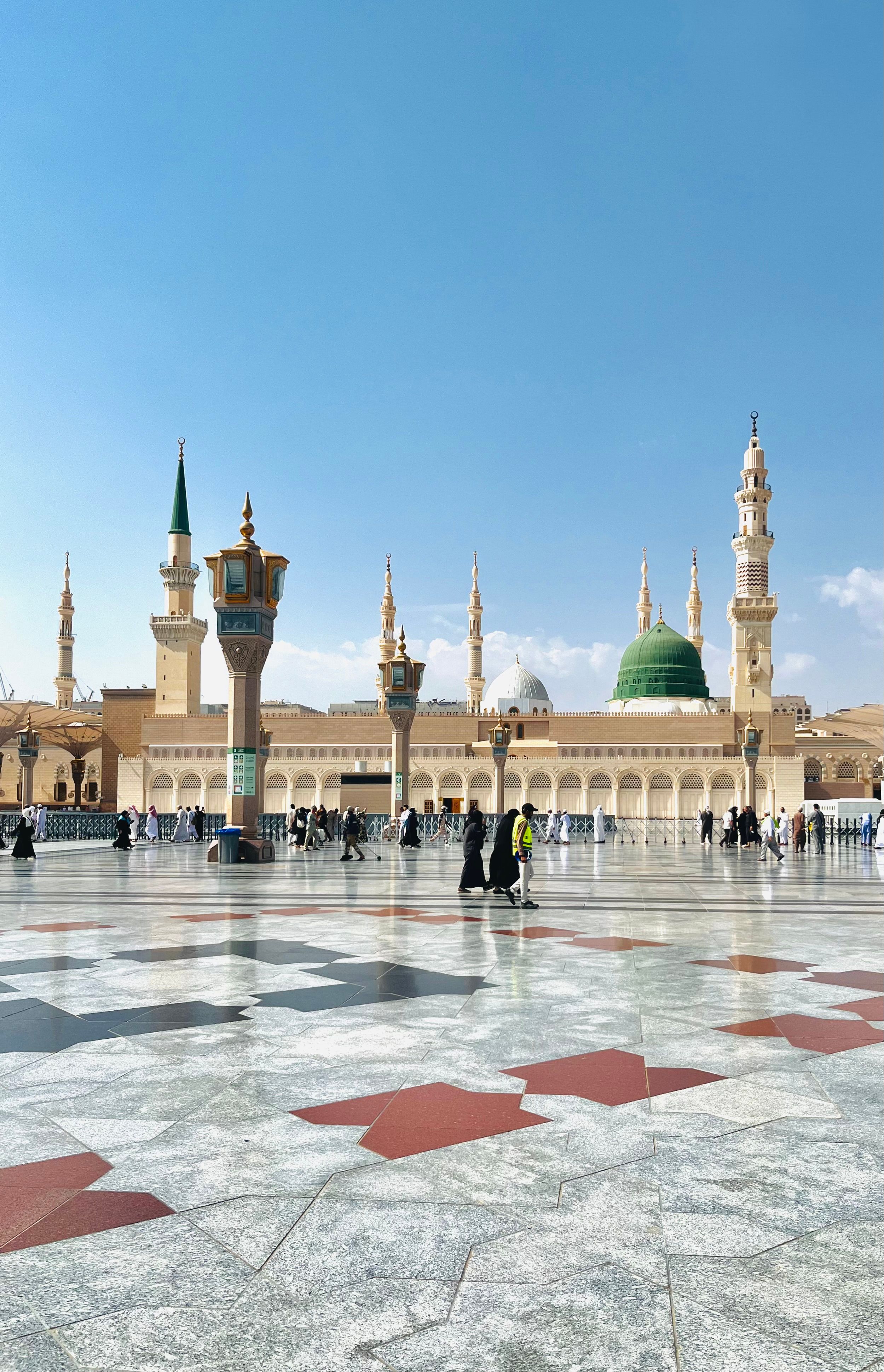 Mosque Minarets behind Window Frame · Free Stock Photo