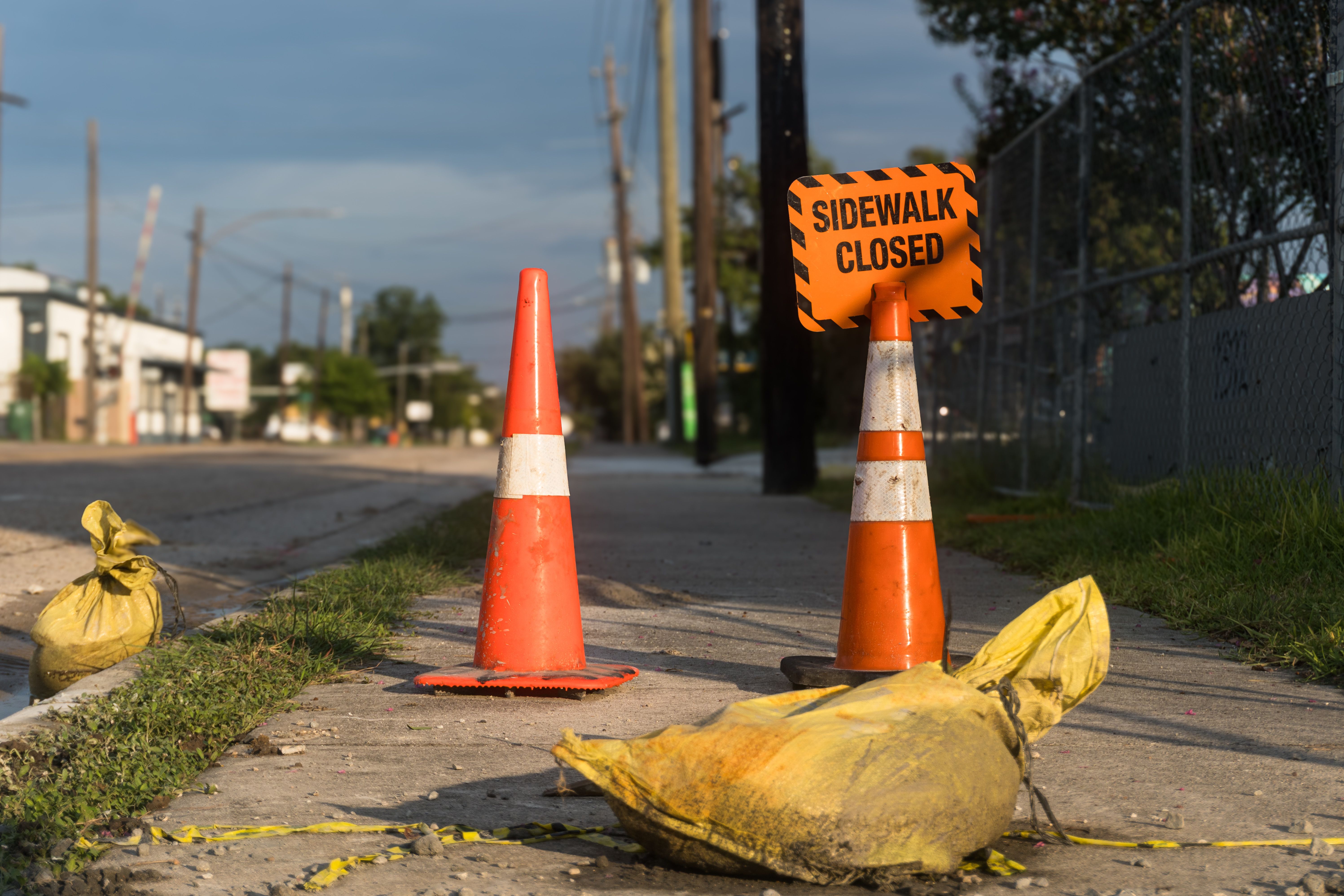 Sidewalk Closed Sign with Traffic Cones in Houston · Free Stock Photo