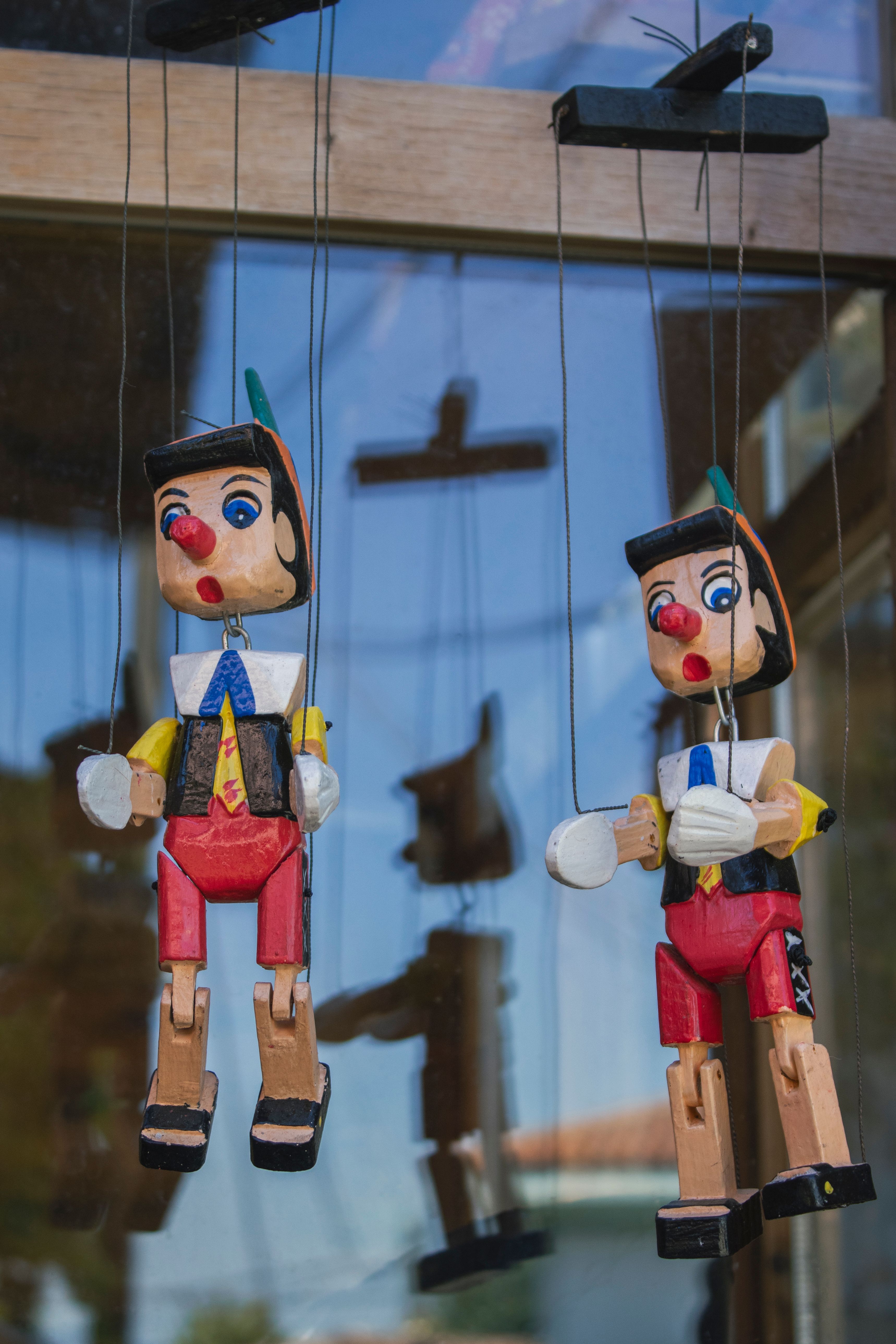 Colorful Pinocchio Puppets in Turkish Window · Free Stock Photo