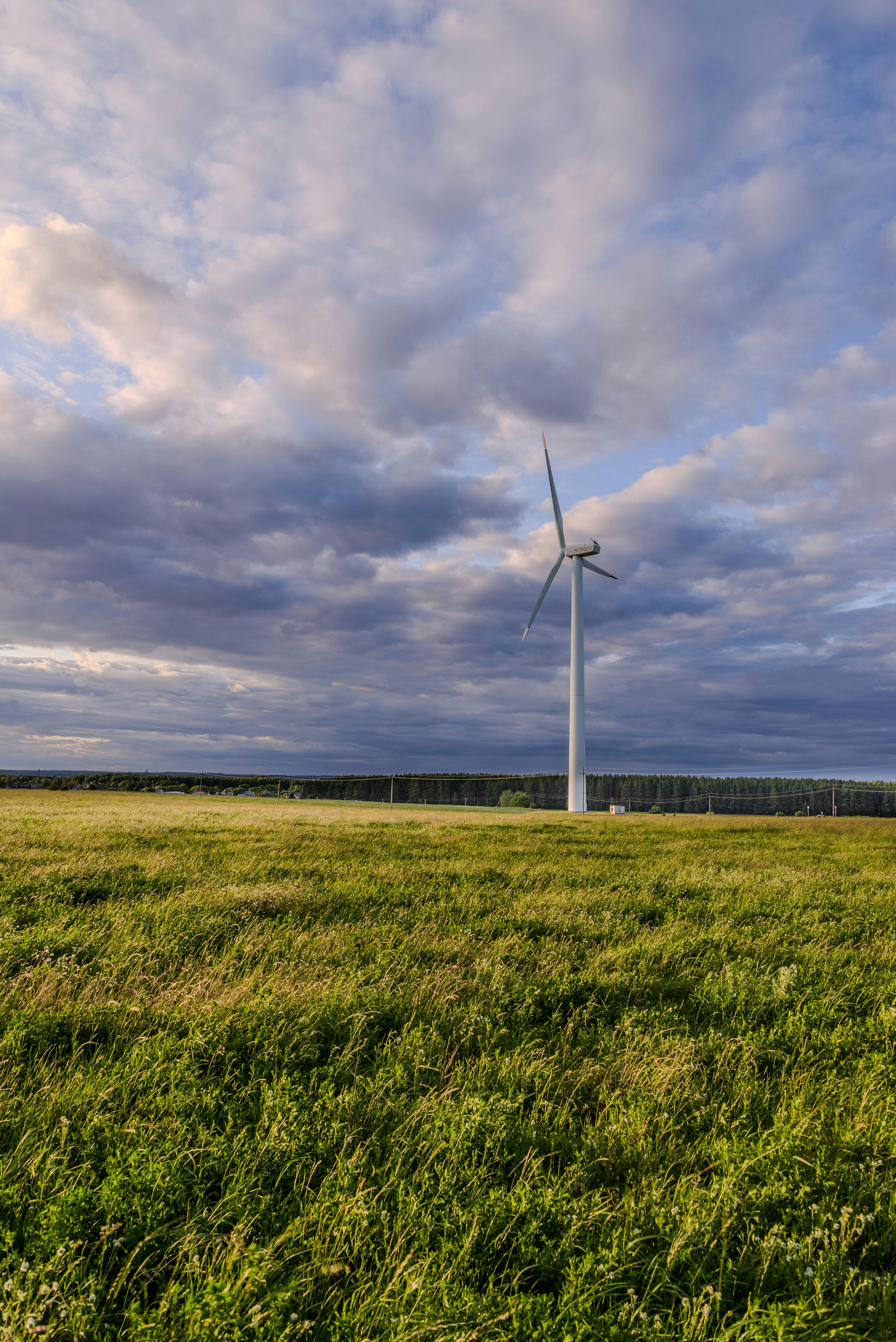 Wind Farm on Green Grass Pastures · Free Stock Photo