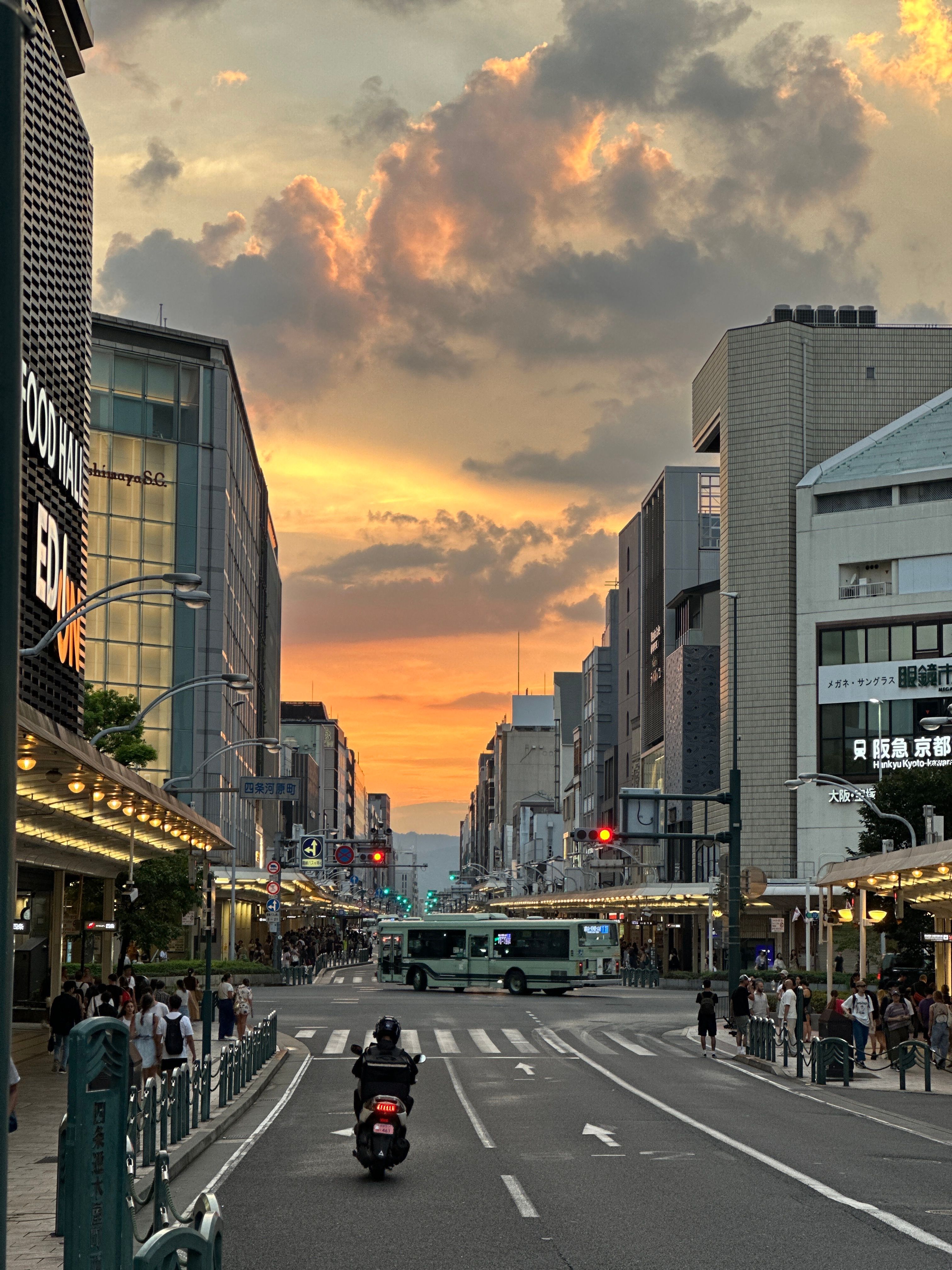 Kyoto City Street at Sunset with Bustling Activity · Free Stock Photo