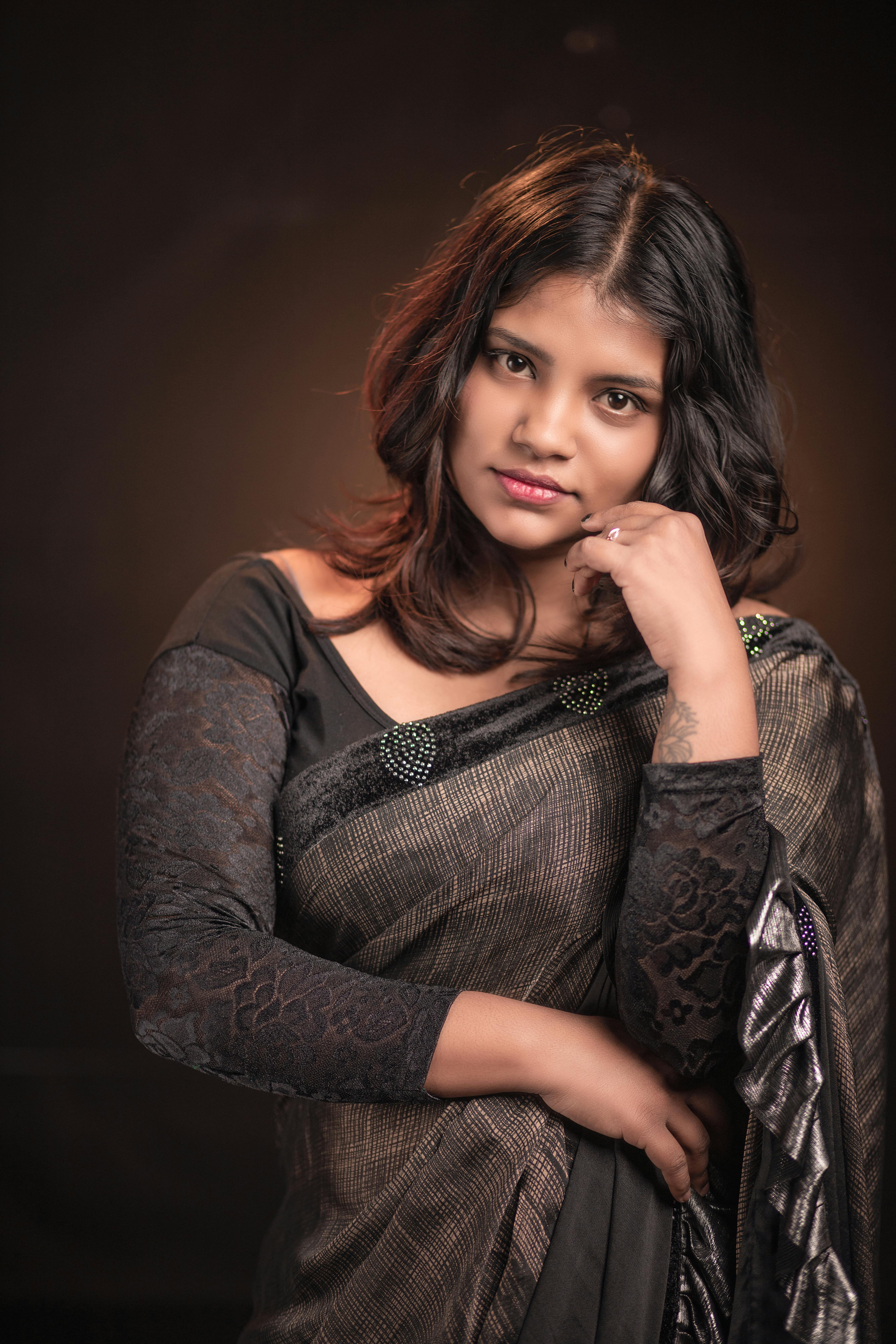 Elegant Portrait of a Woman in Glamorous Attire · Free Stock Photo