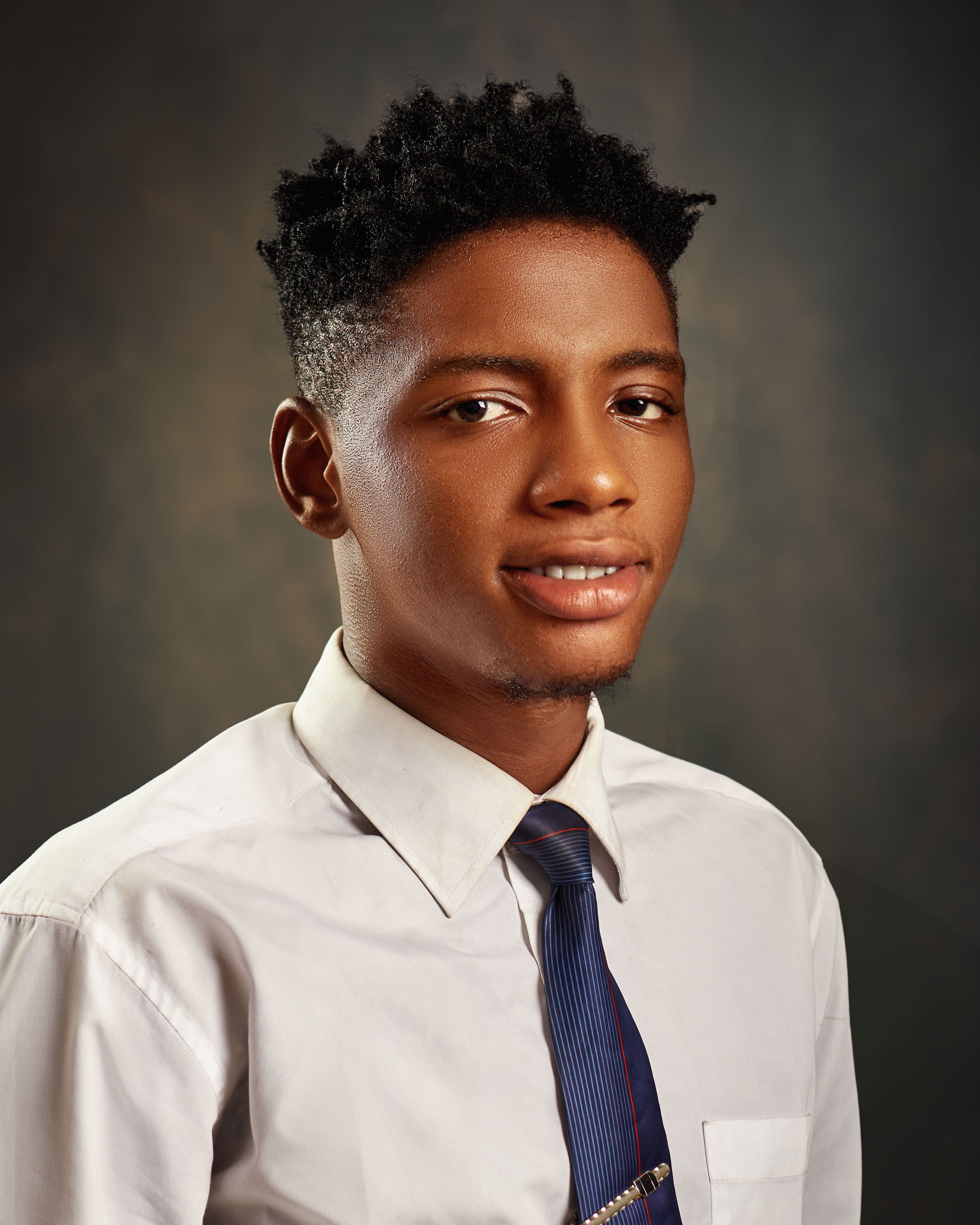 Young Professional in Formal Attire Portrait · Free Stock Photo